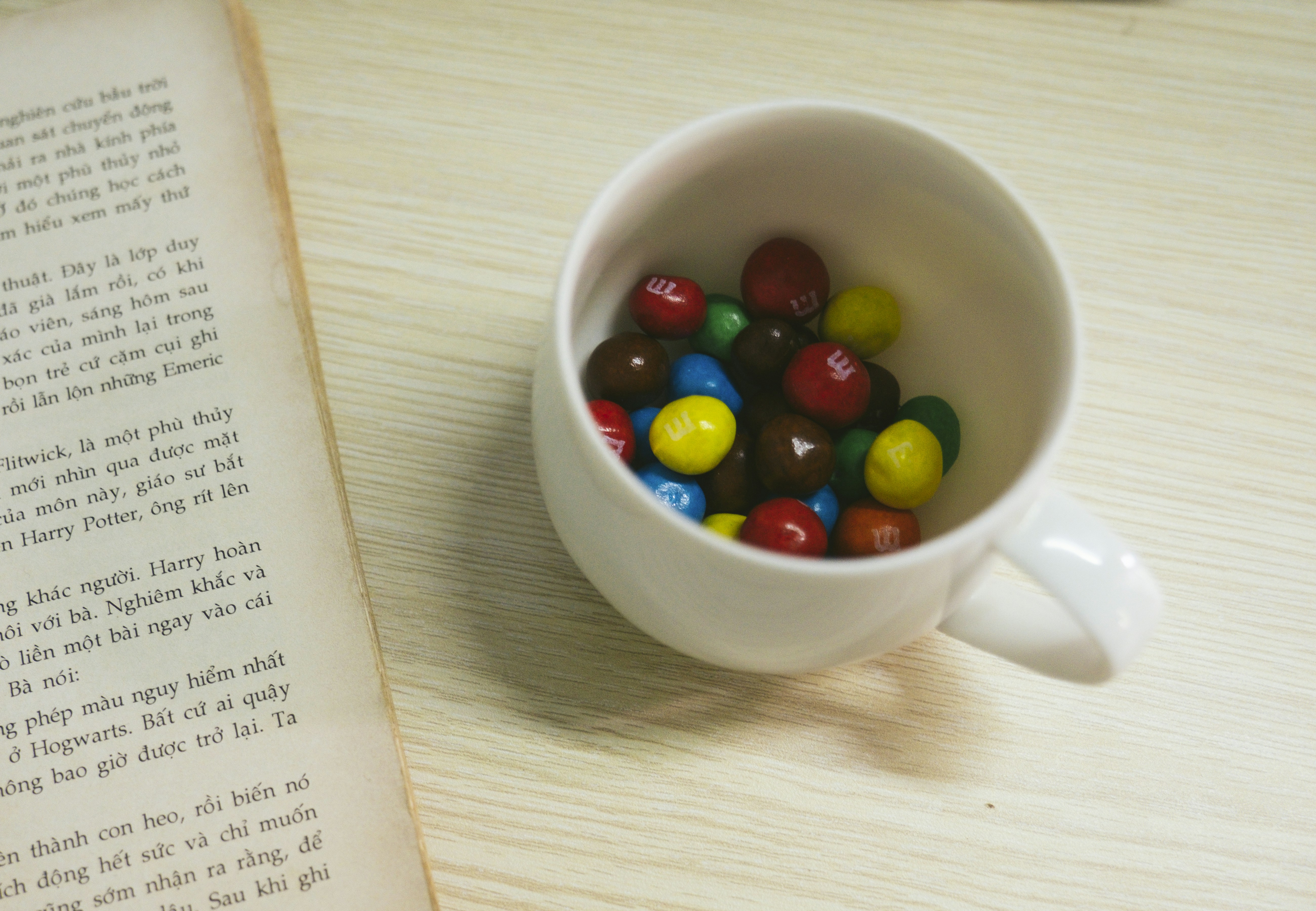 Color Confetti Cup: A Quiet Desk Still Life with M&M Candies