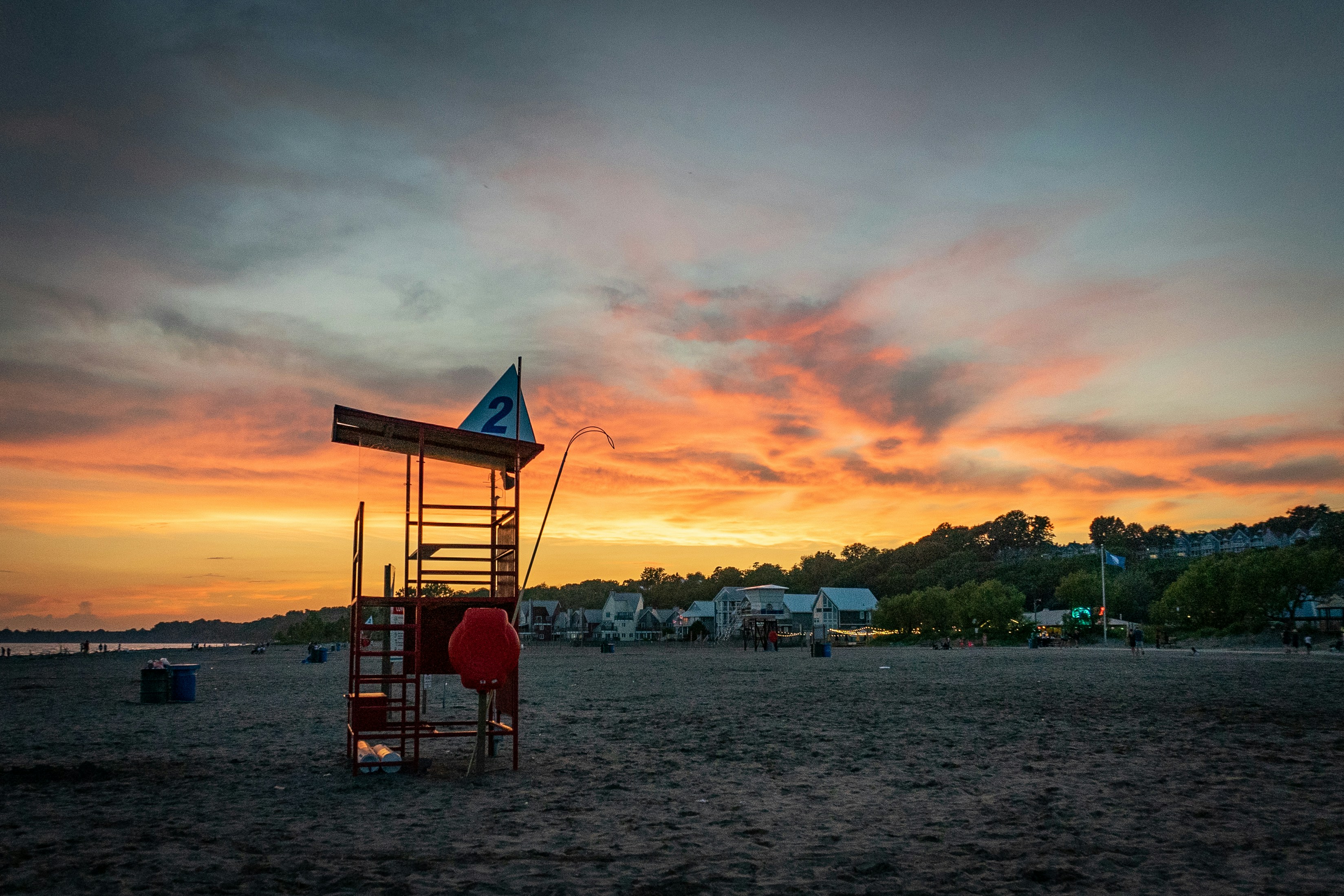 Sunset Lifeguard Tower Against a Fiery Sky