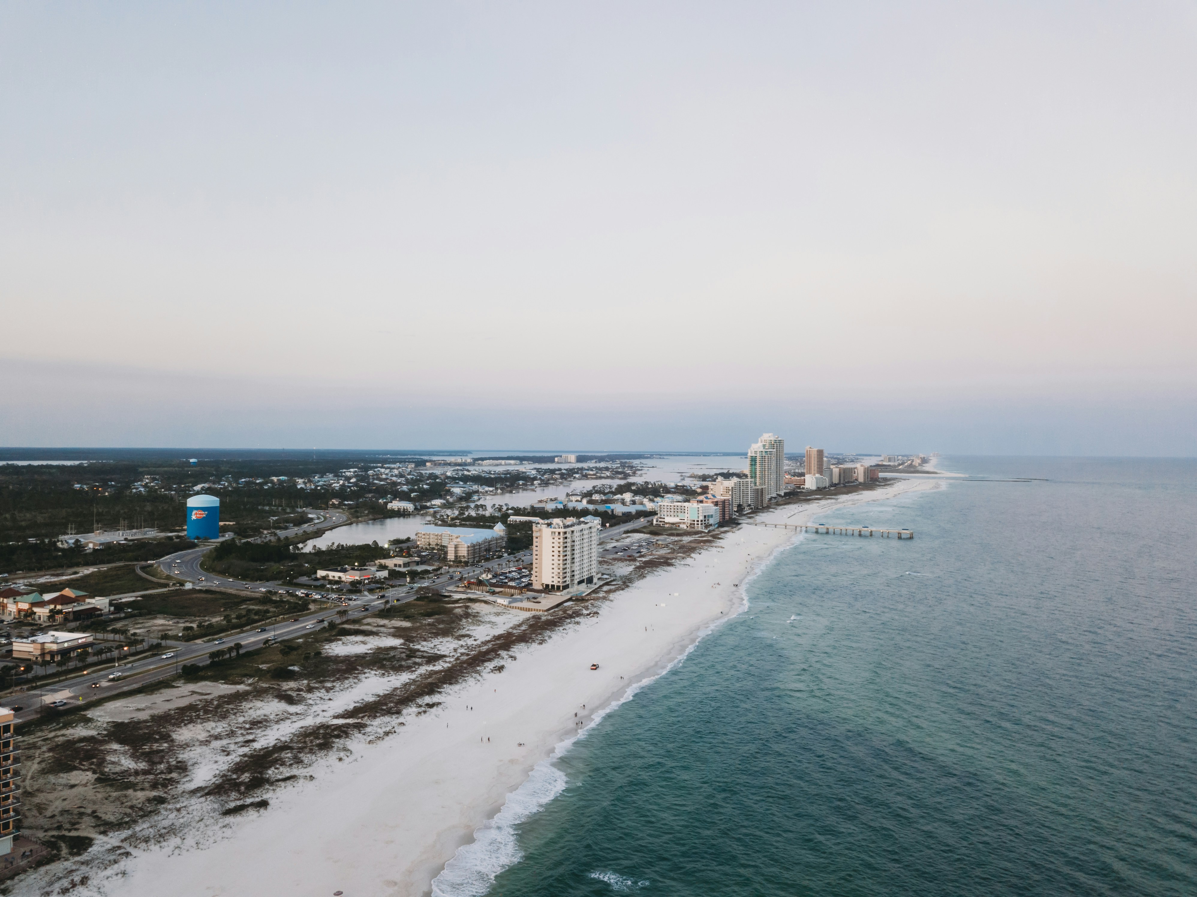 Aerial view of city buildings near sea during daytime photo – Free ...