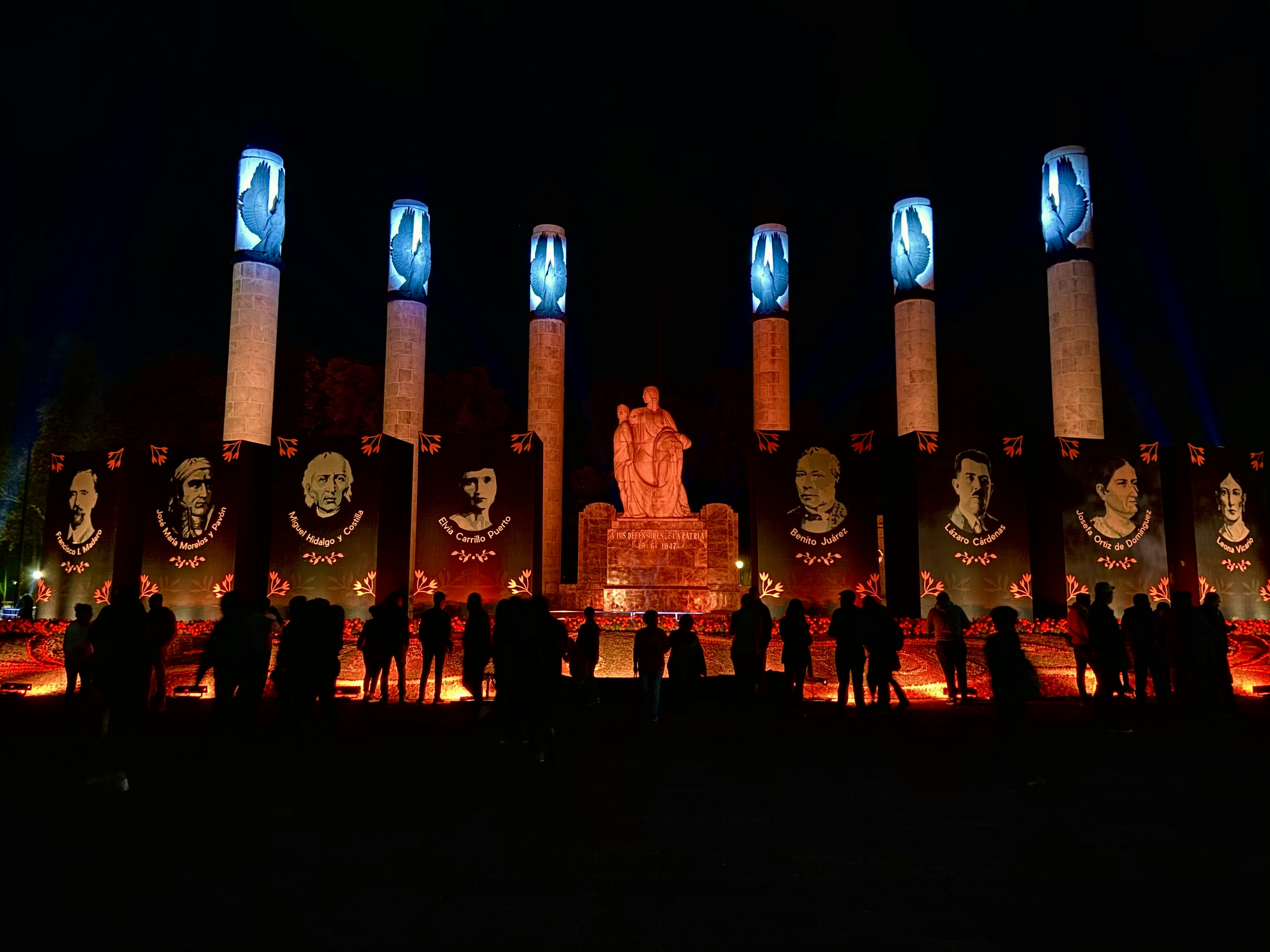 Lit Pillars and Silhouettes: Night at the Monumental Circle