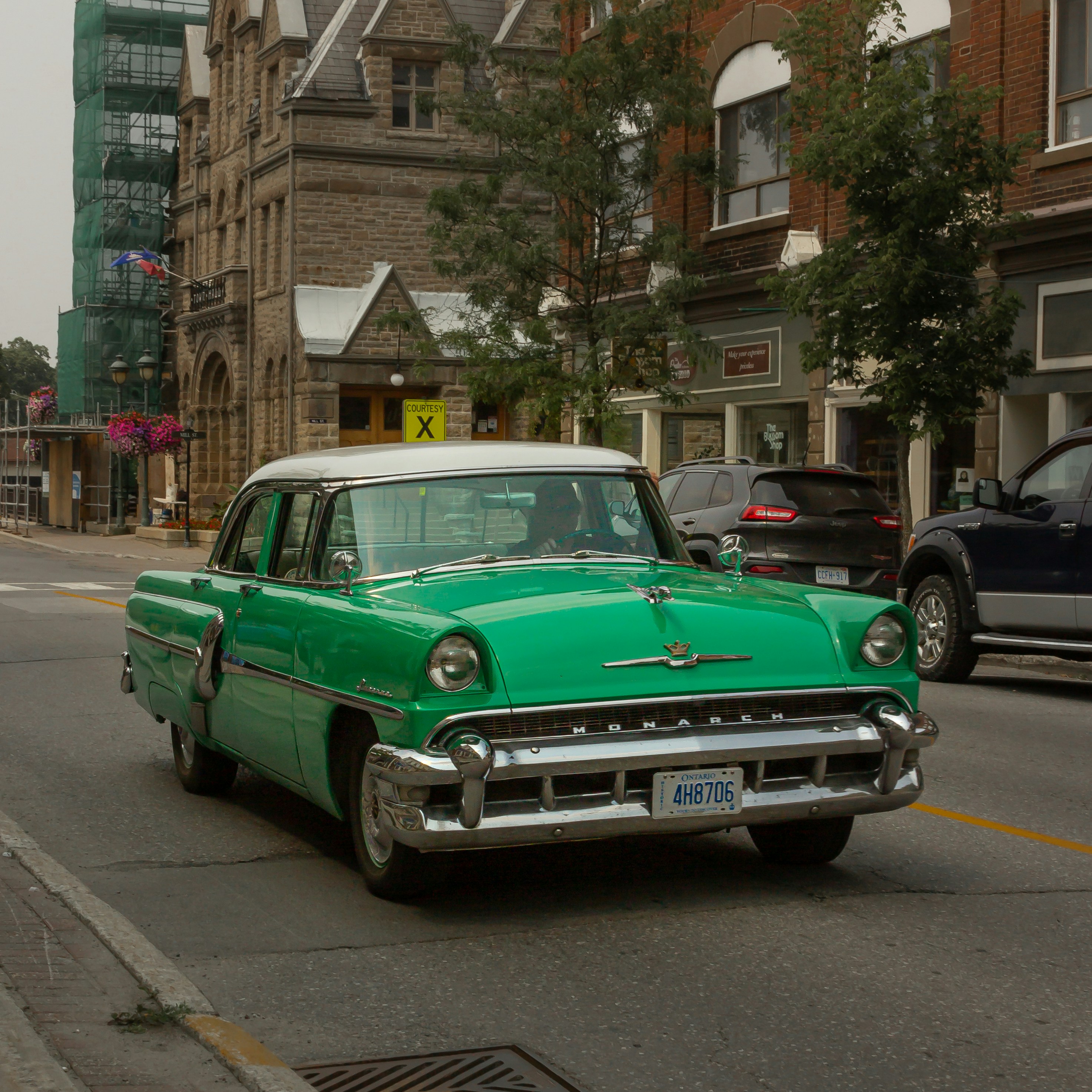 Green chevrolet car on road during daytime photo – Free Car Image on ...