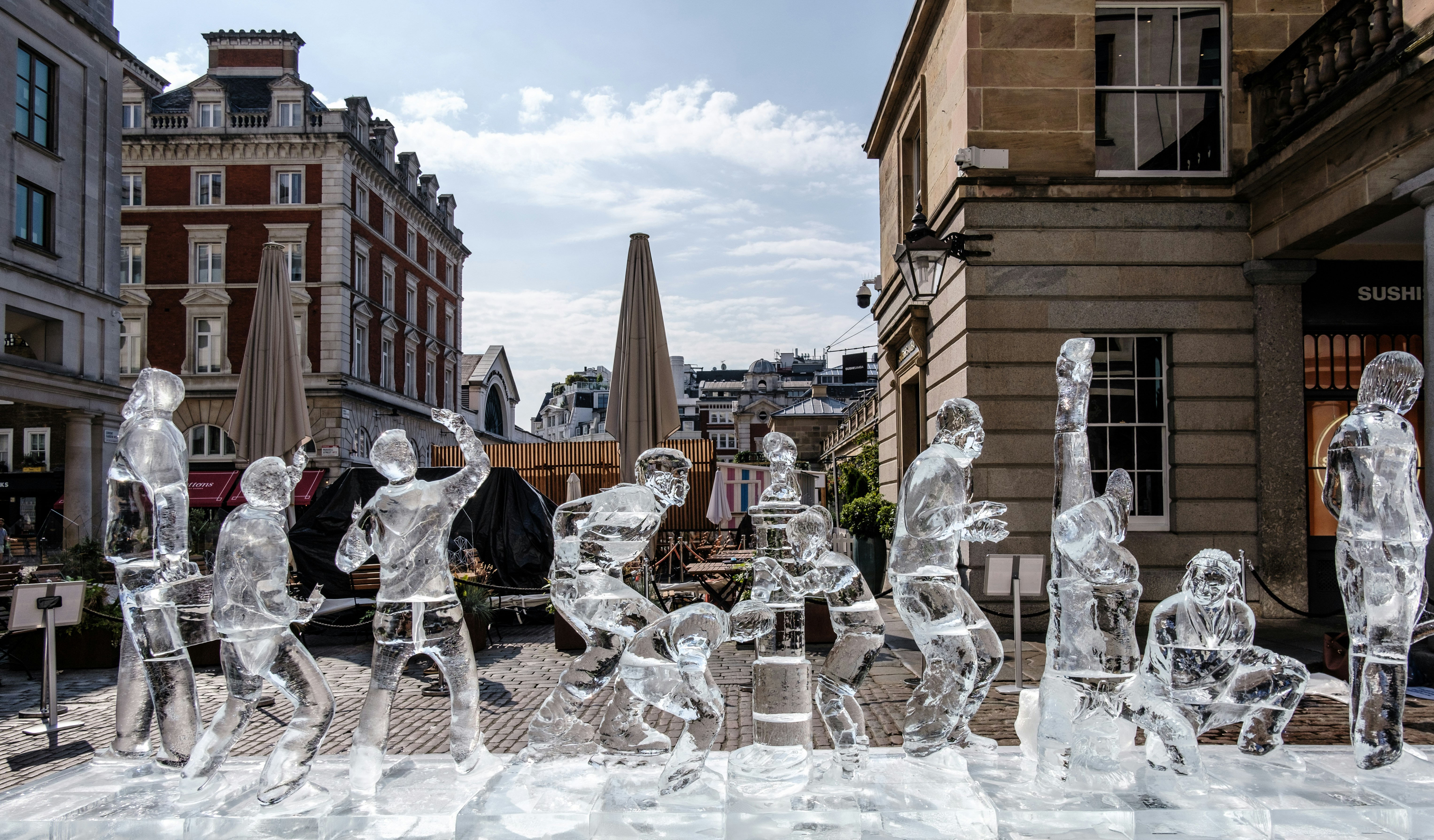 Ice Mosaic: A Crowd of Crystal Figures in a European Square