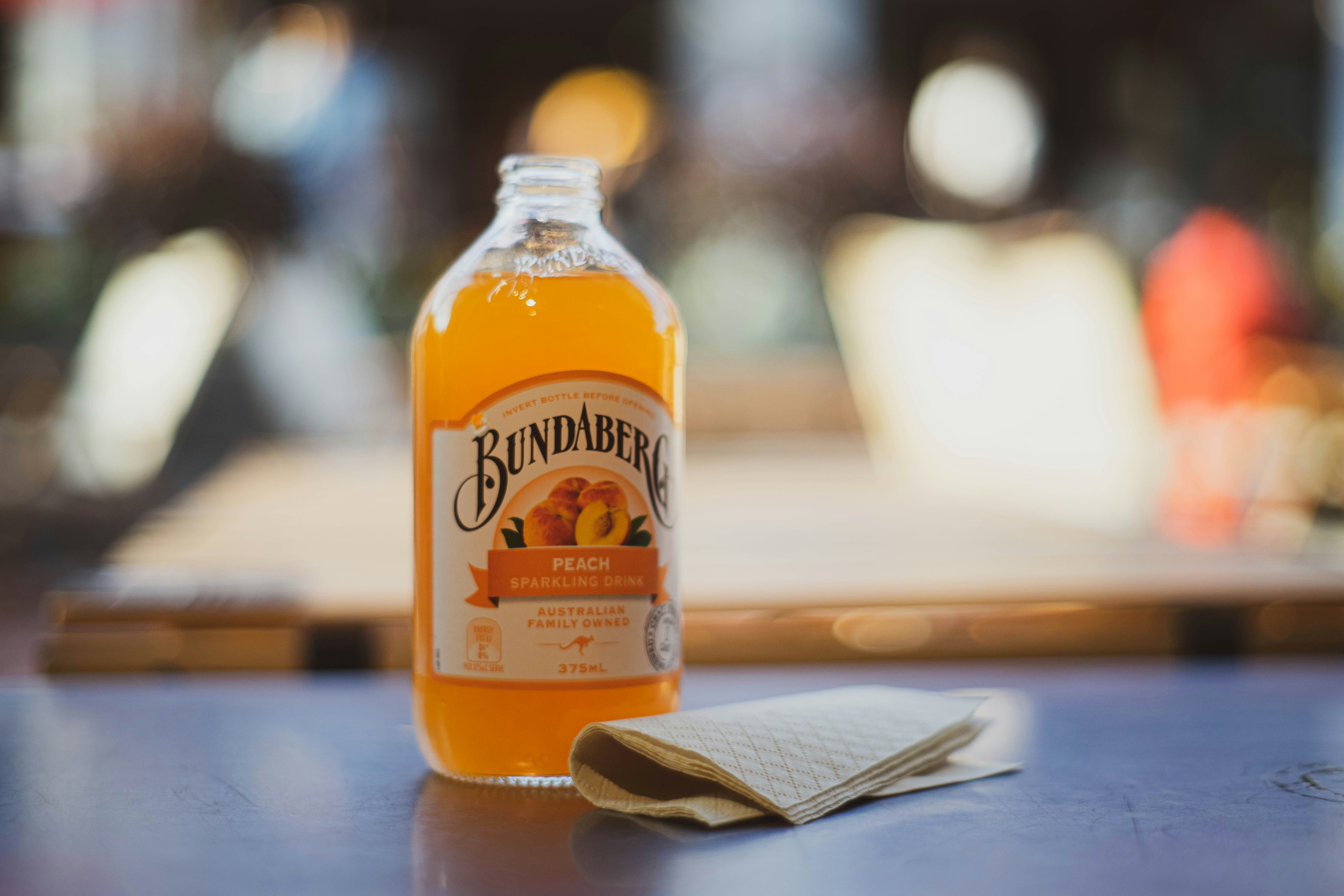 Sunlit Peach Fizz in a Quiet Café