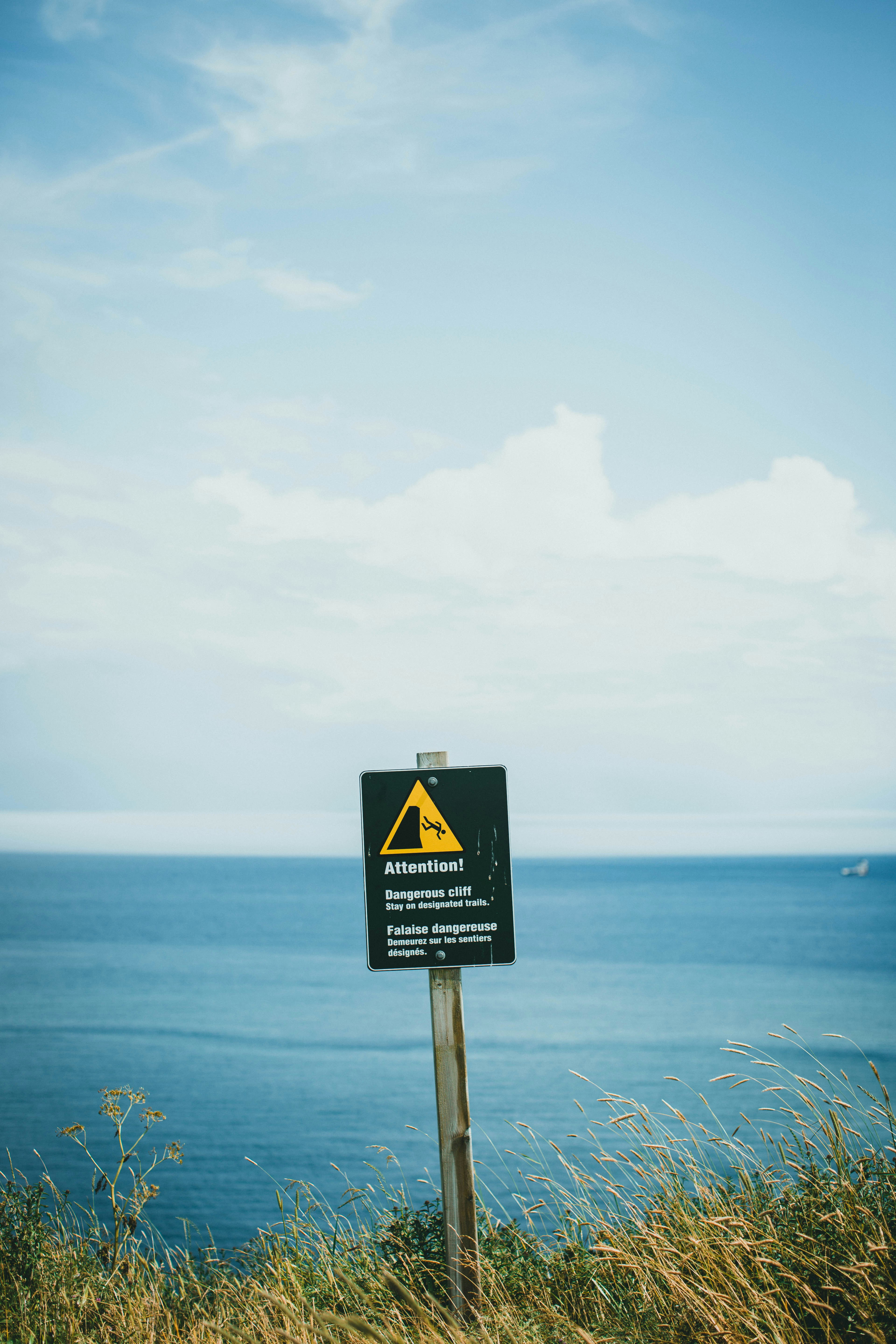 Warning Sign Overlooking a Sea Vista