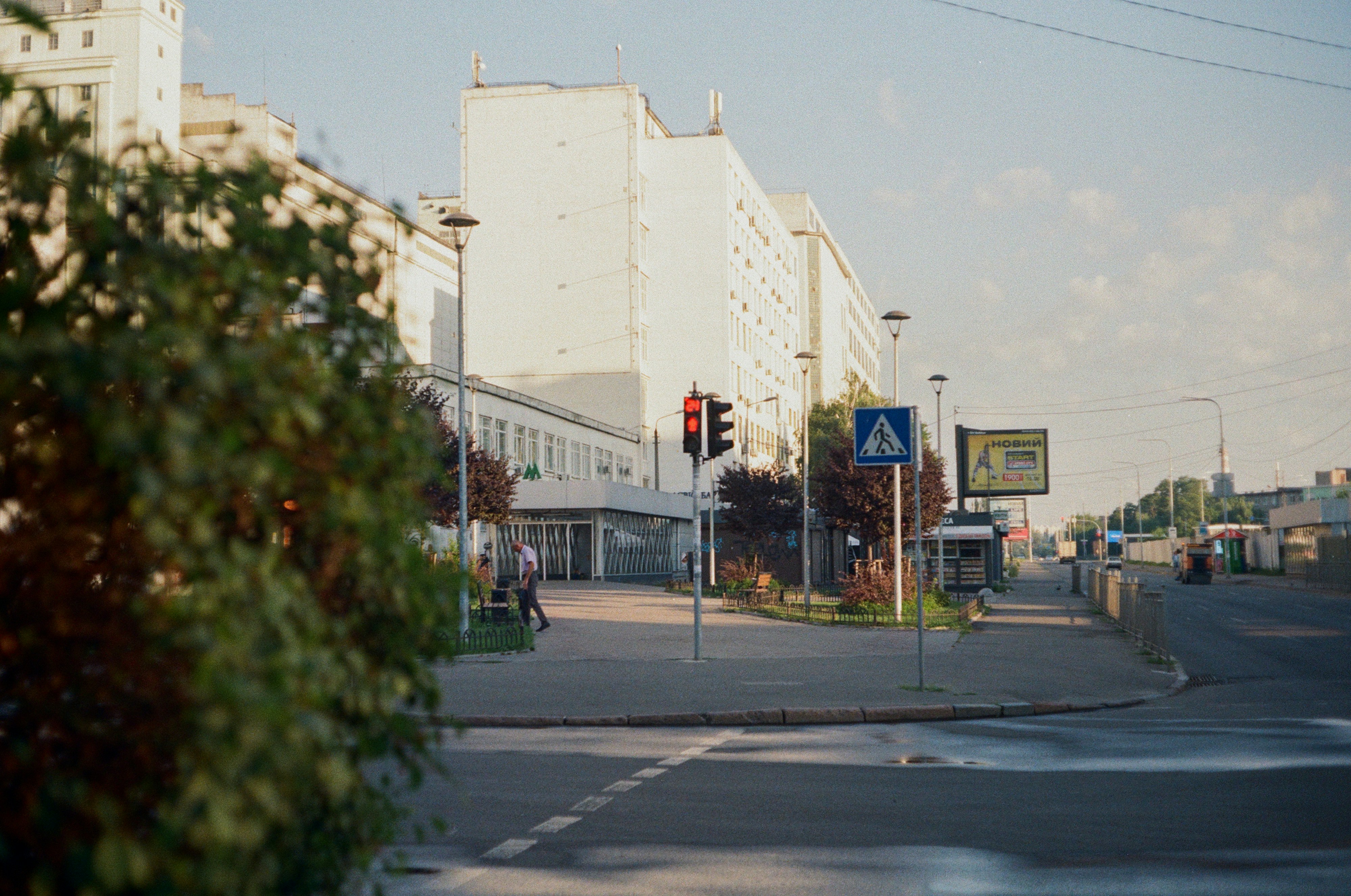 White concrete building near road during daytime photo – Free Podil ...