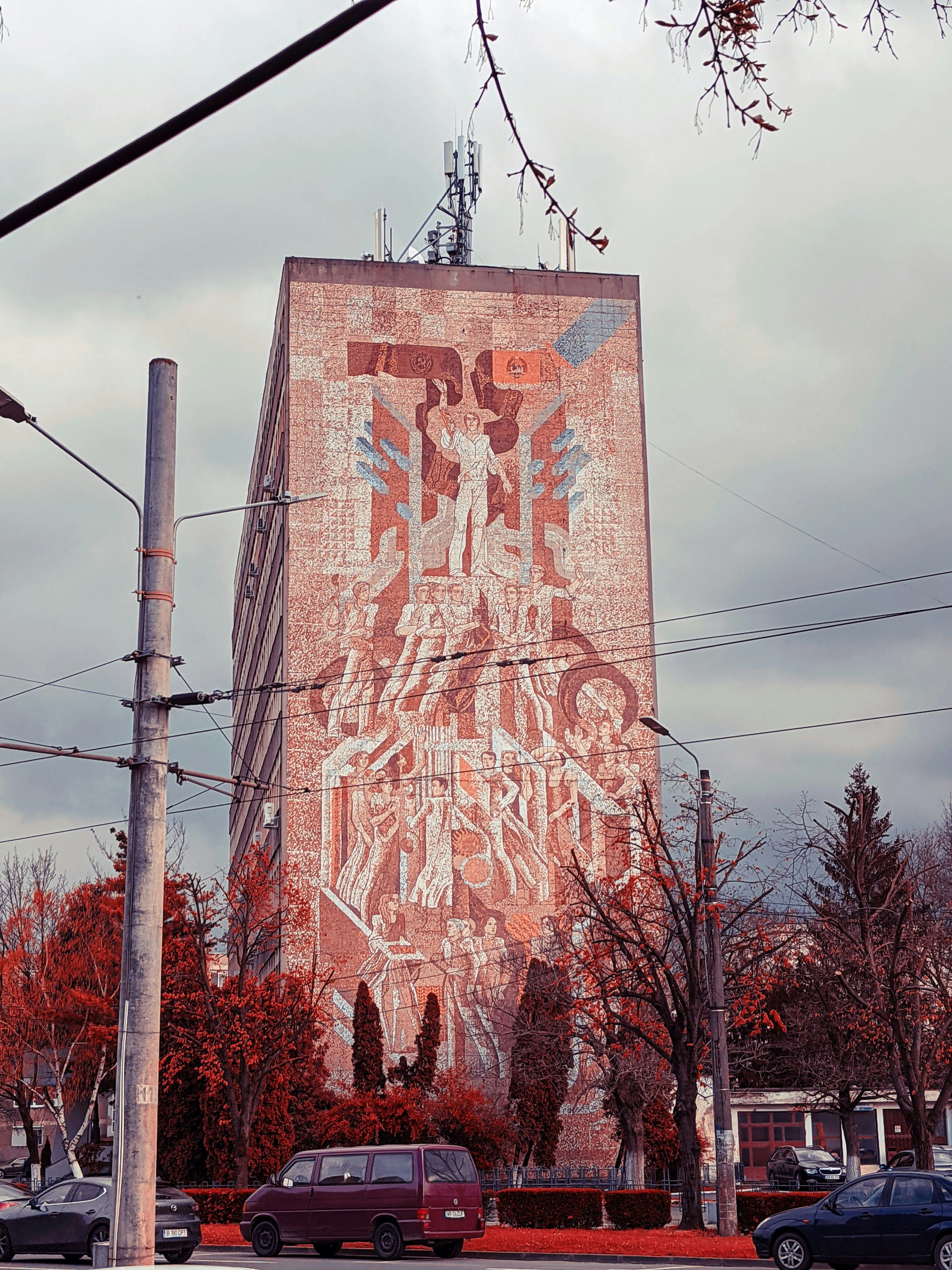 Mosaic Tower: A Monumental Portrait Climbs the Brick Facade