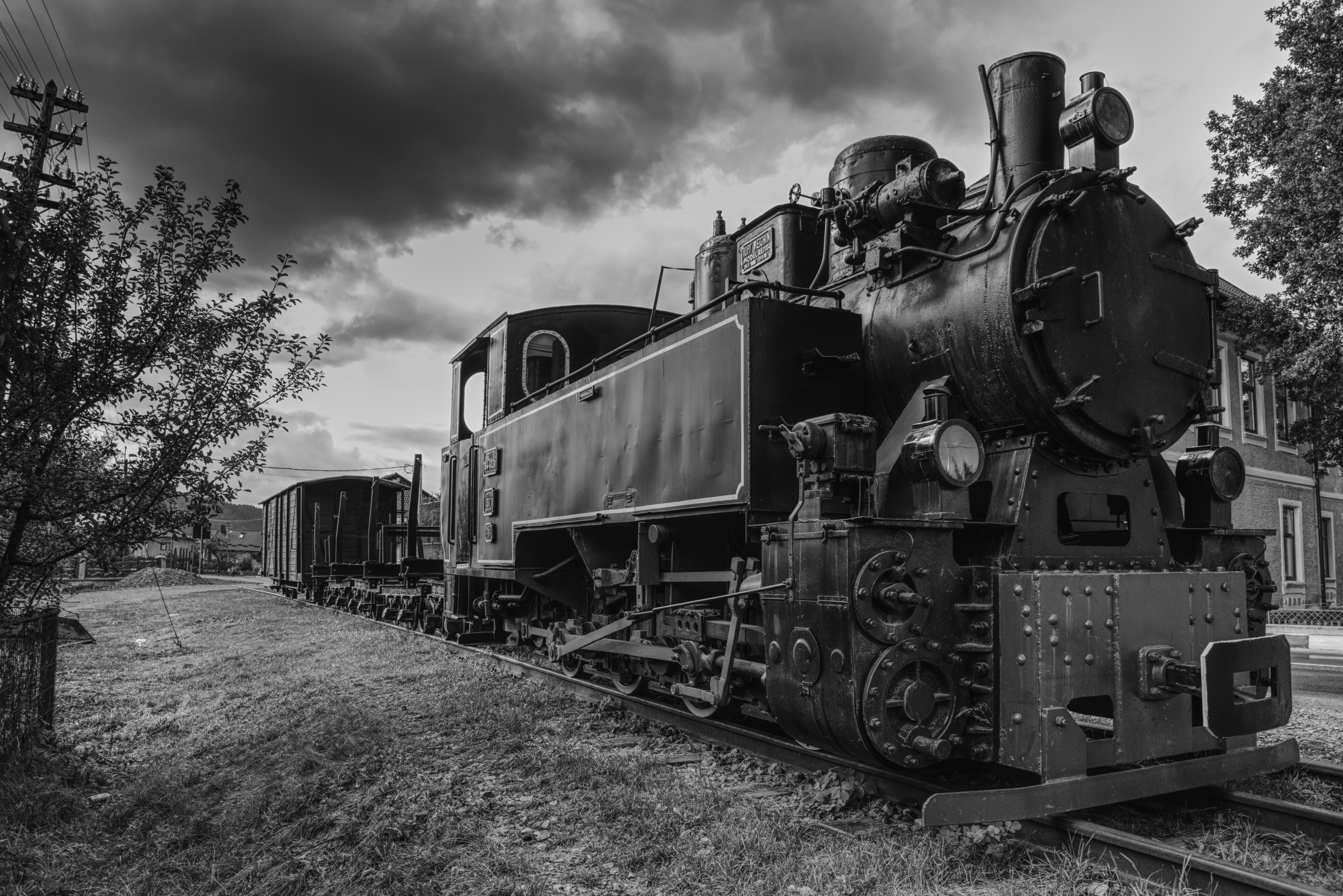 Grayscale photo of train under cloudy sky photo – Free Romania Image on ...