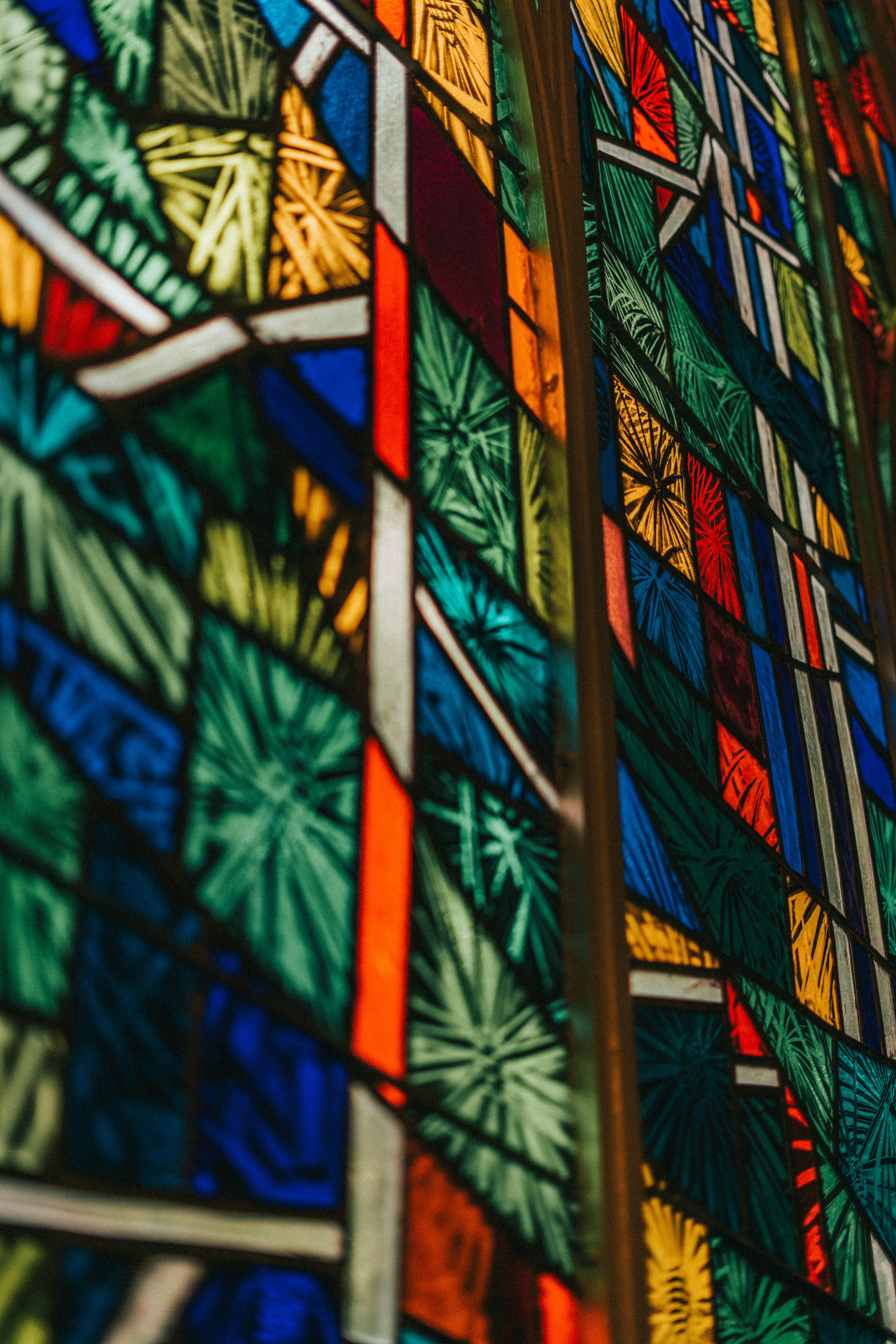 Prismatic Cathedral: A Close-Up of Multicolored Glass Grids