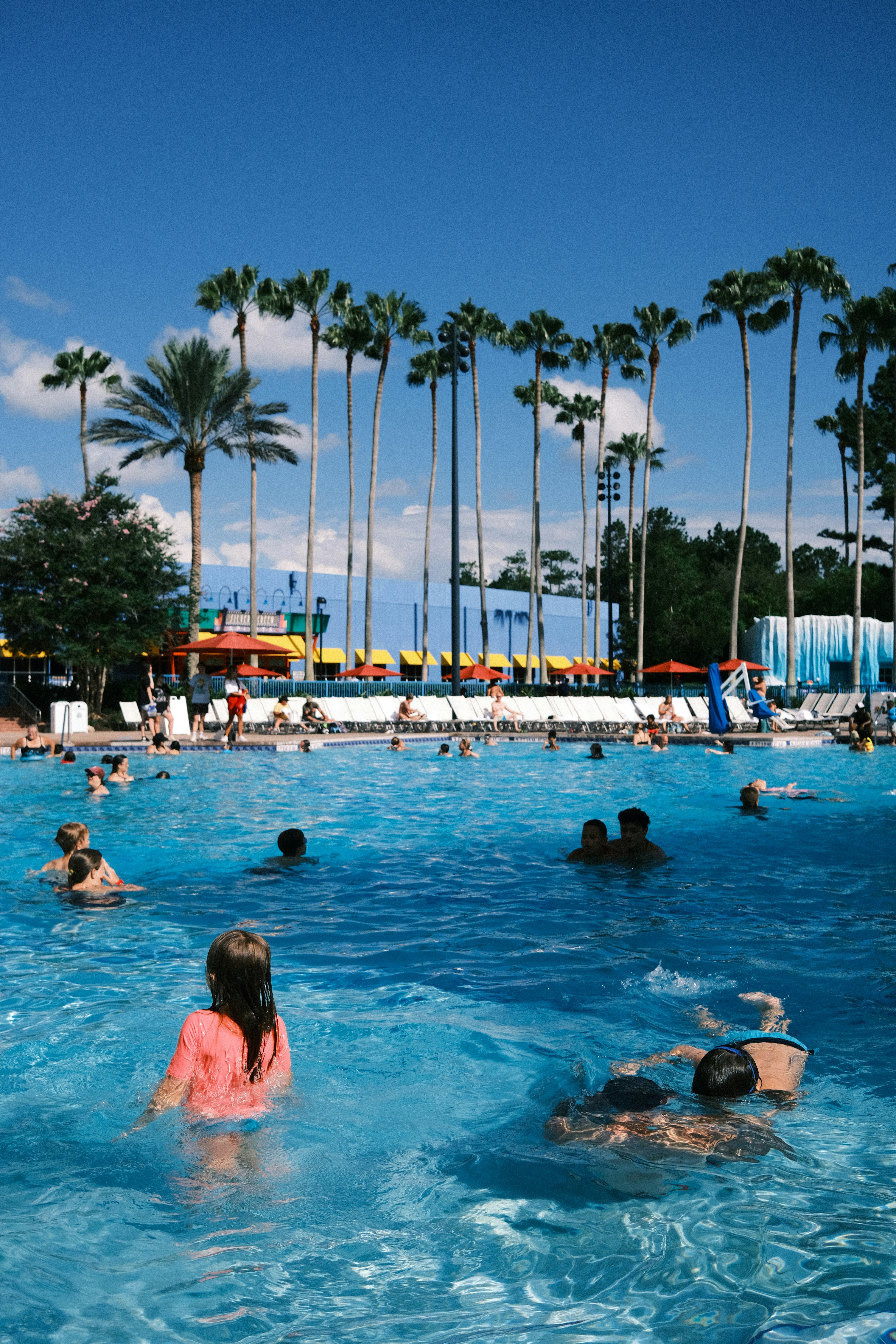 People in swimming pool during daytime photo – Free Human Image on Unsplash