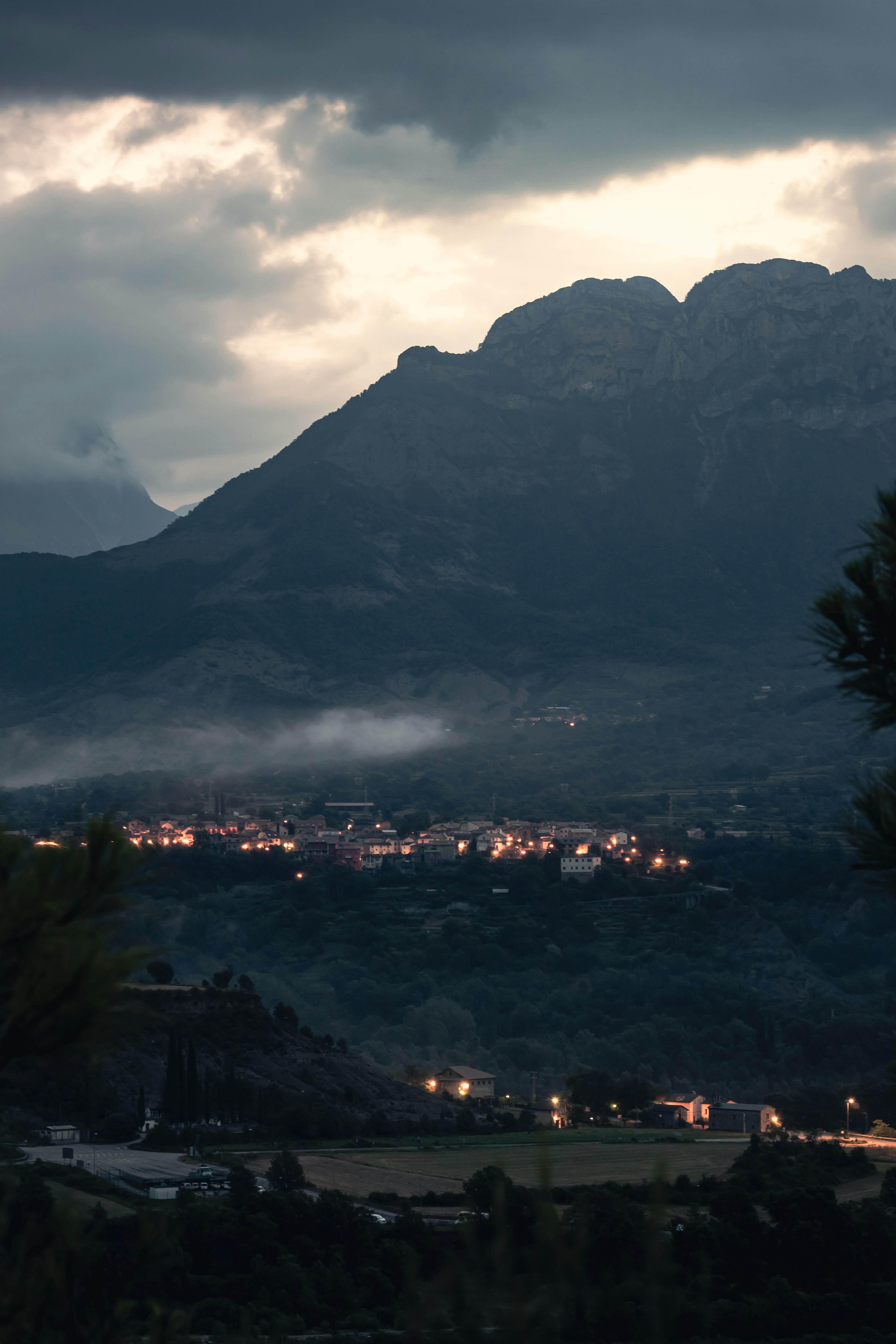 Quiet Valley Beneath a Cloudy Peak