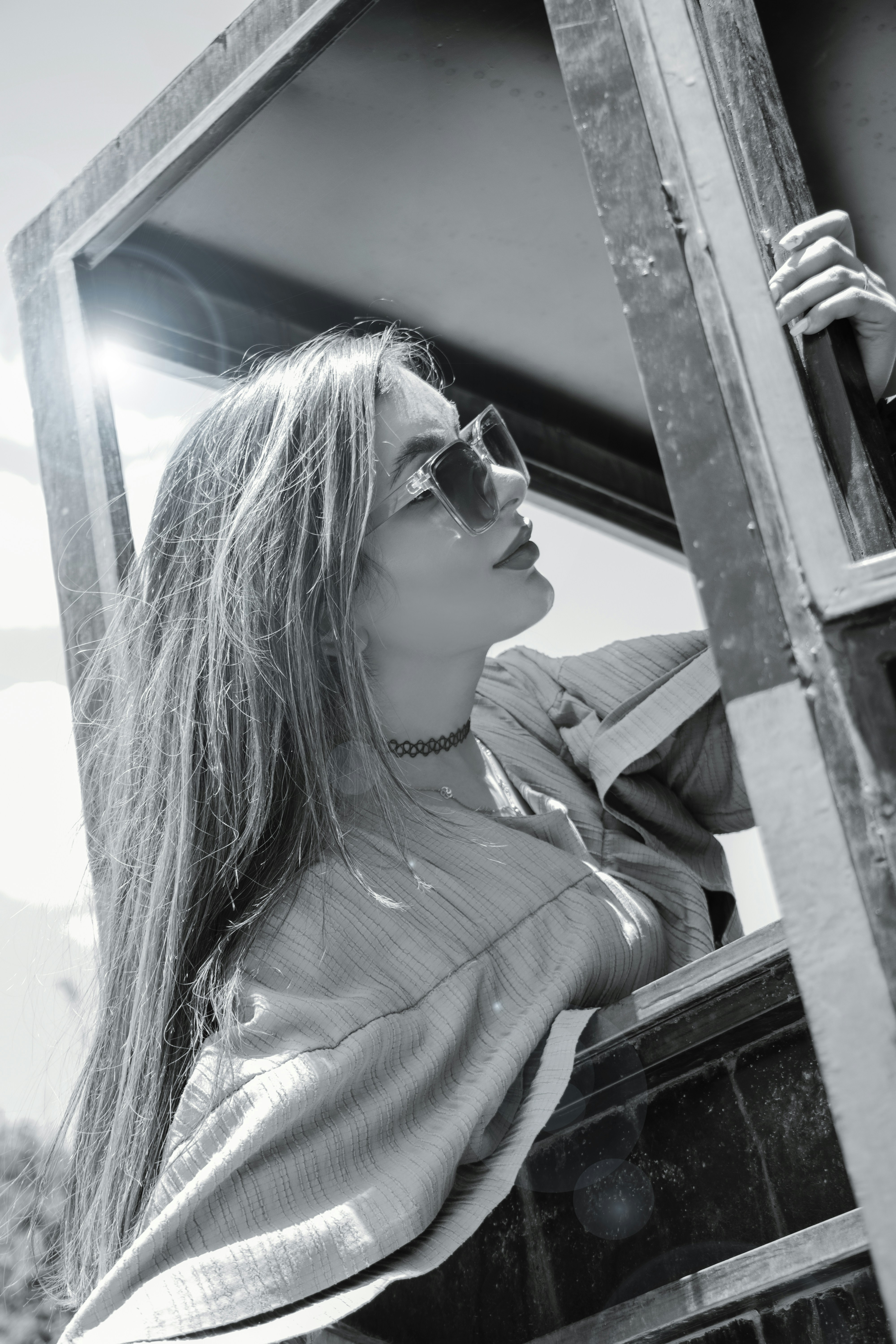 Glimpse Through the Window: A Woman in Flight
