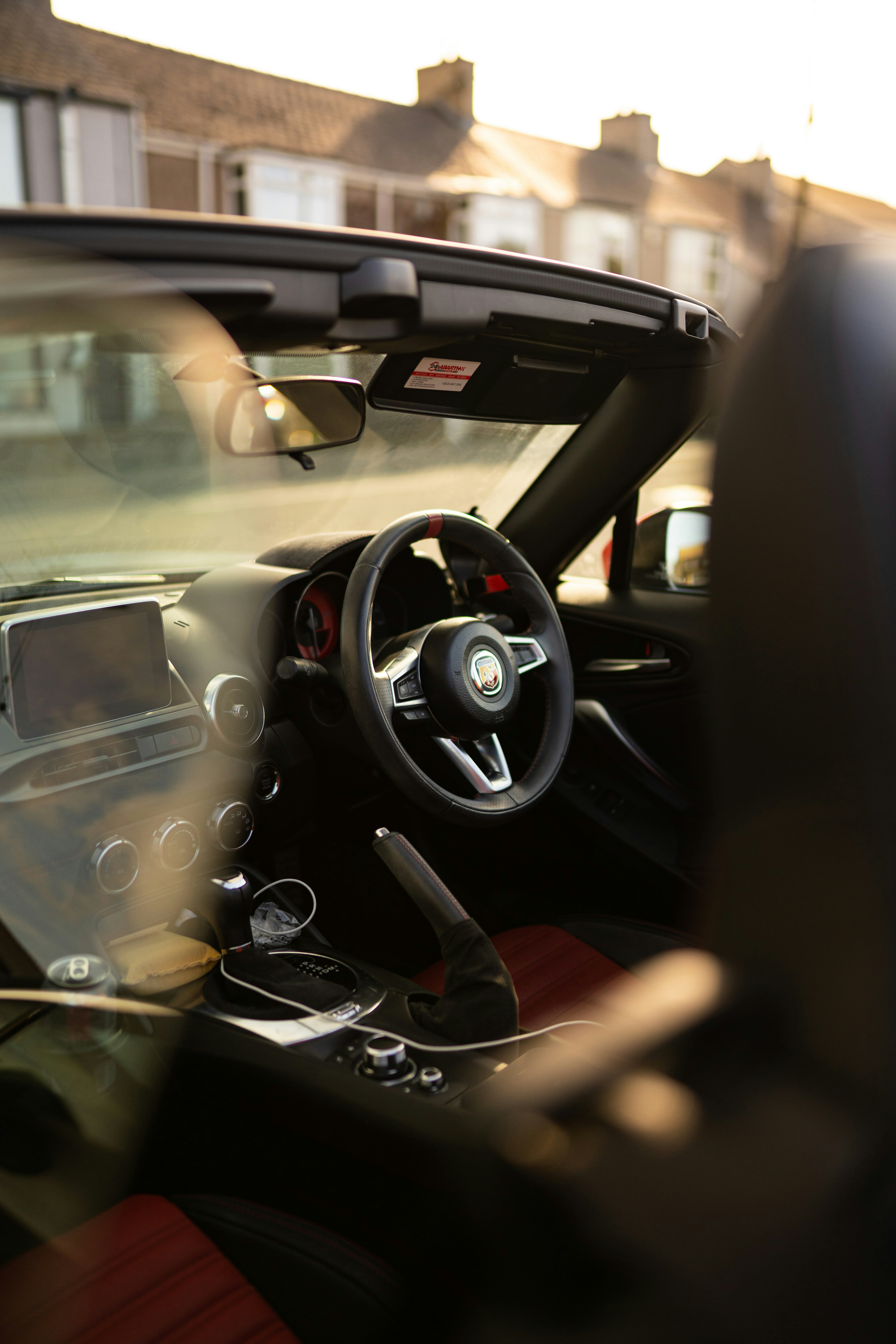 Warm Afternoon Cockpit: The Steering Wheel at the Heart of a Convertible