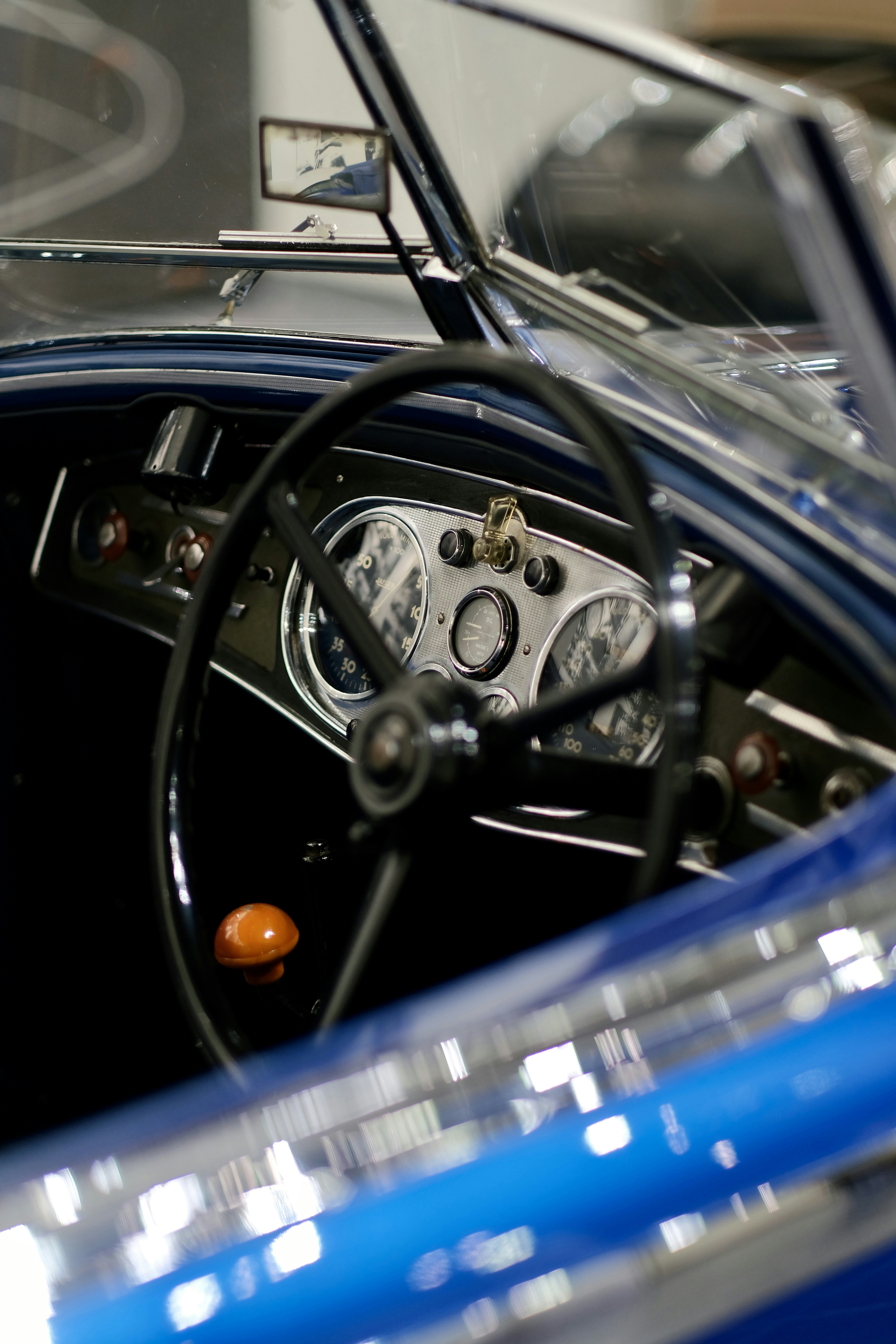 Gauges and Chrome in a Vintage Blue Cockpit