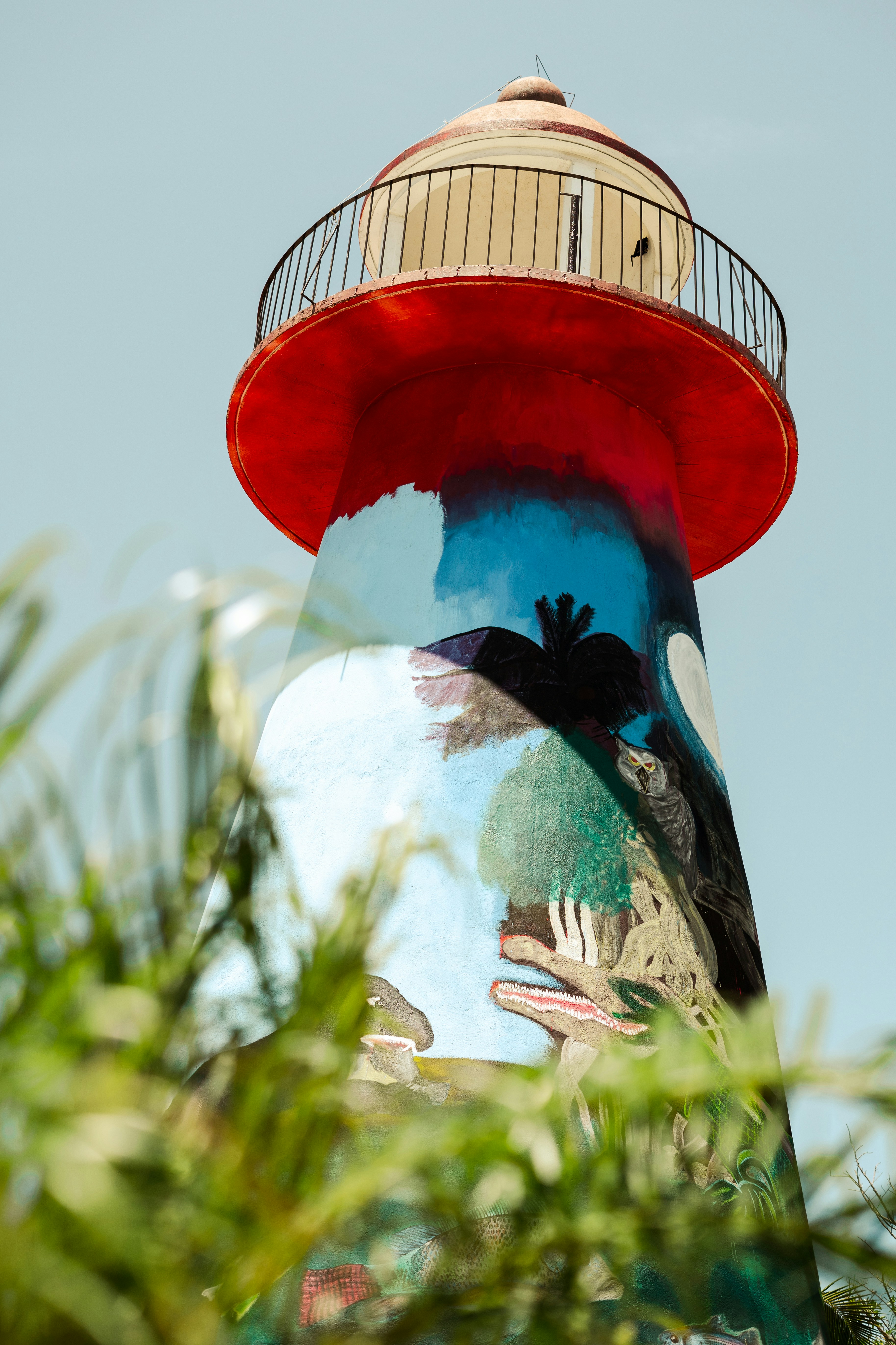 Lighthouse Vista: A Painted Beacon Reaching Toward the Sky