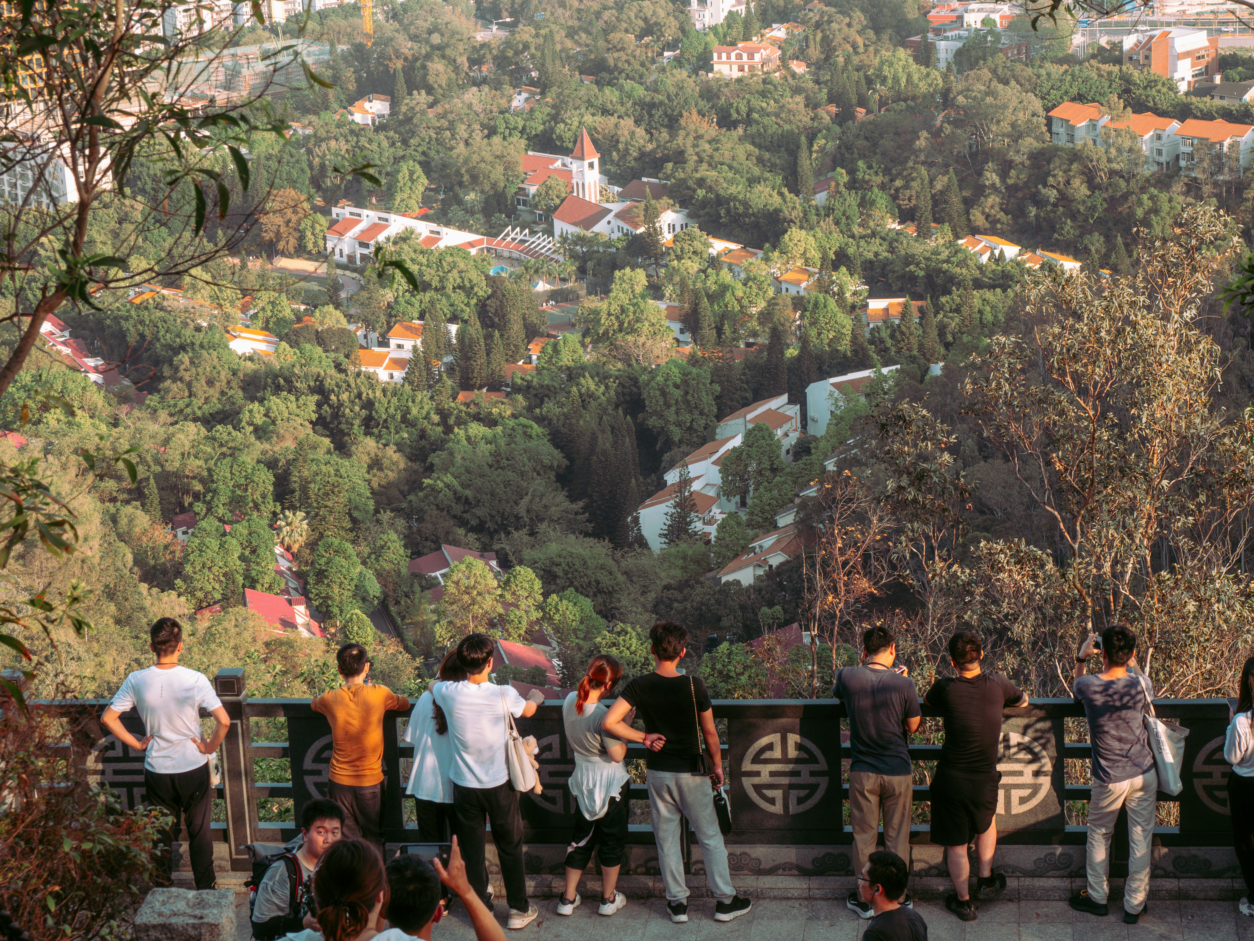 Terrace Overlook: Crowds Framing a Terraced Hillside Town