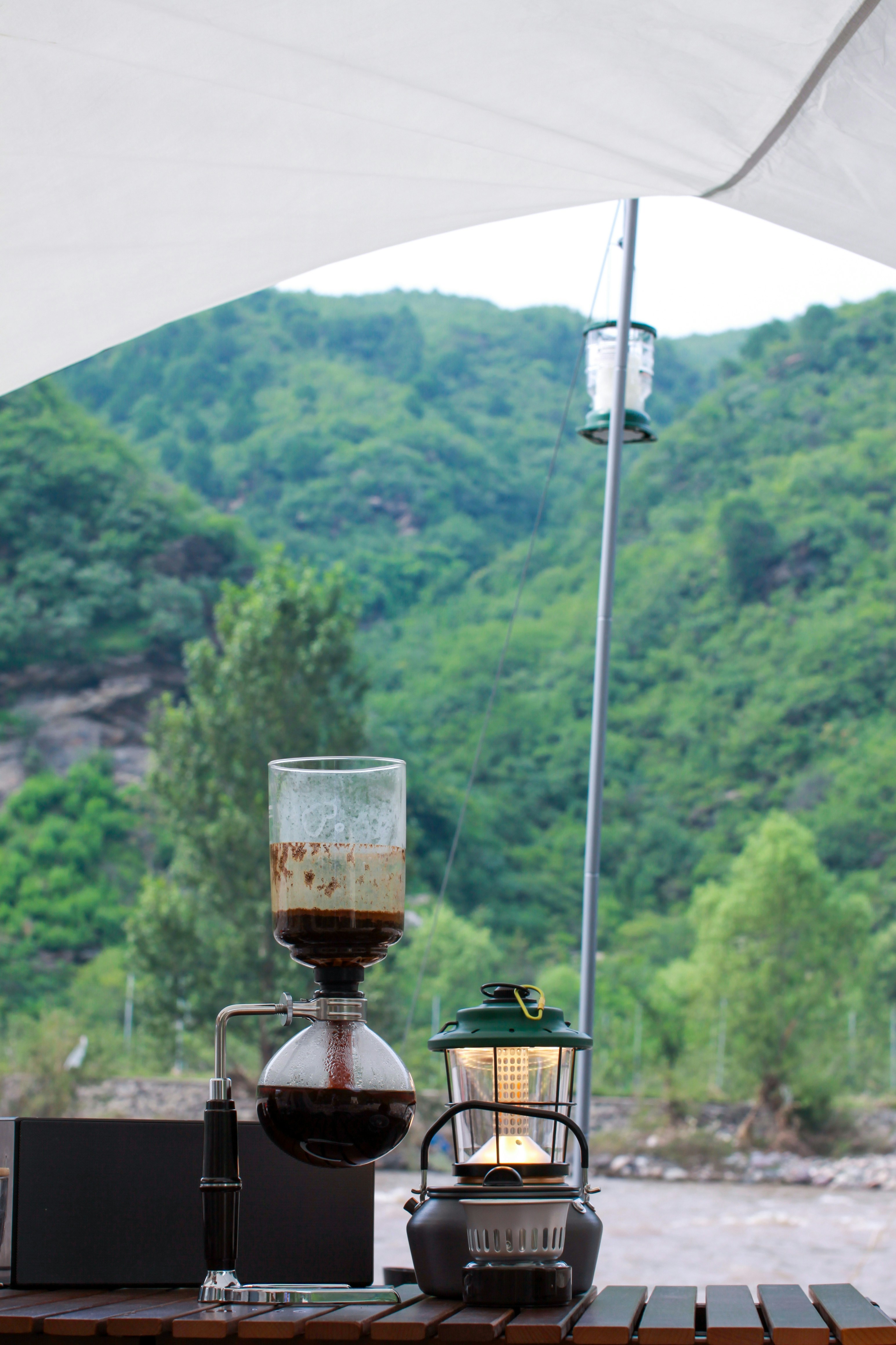 Black and yellow lamp post near green trees during daytime photo – Free ...