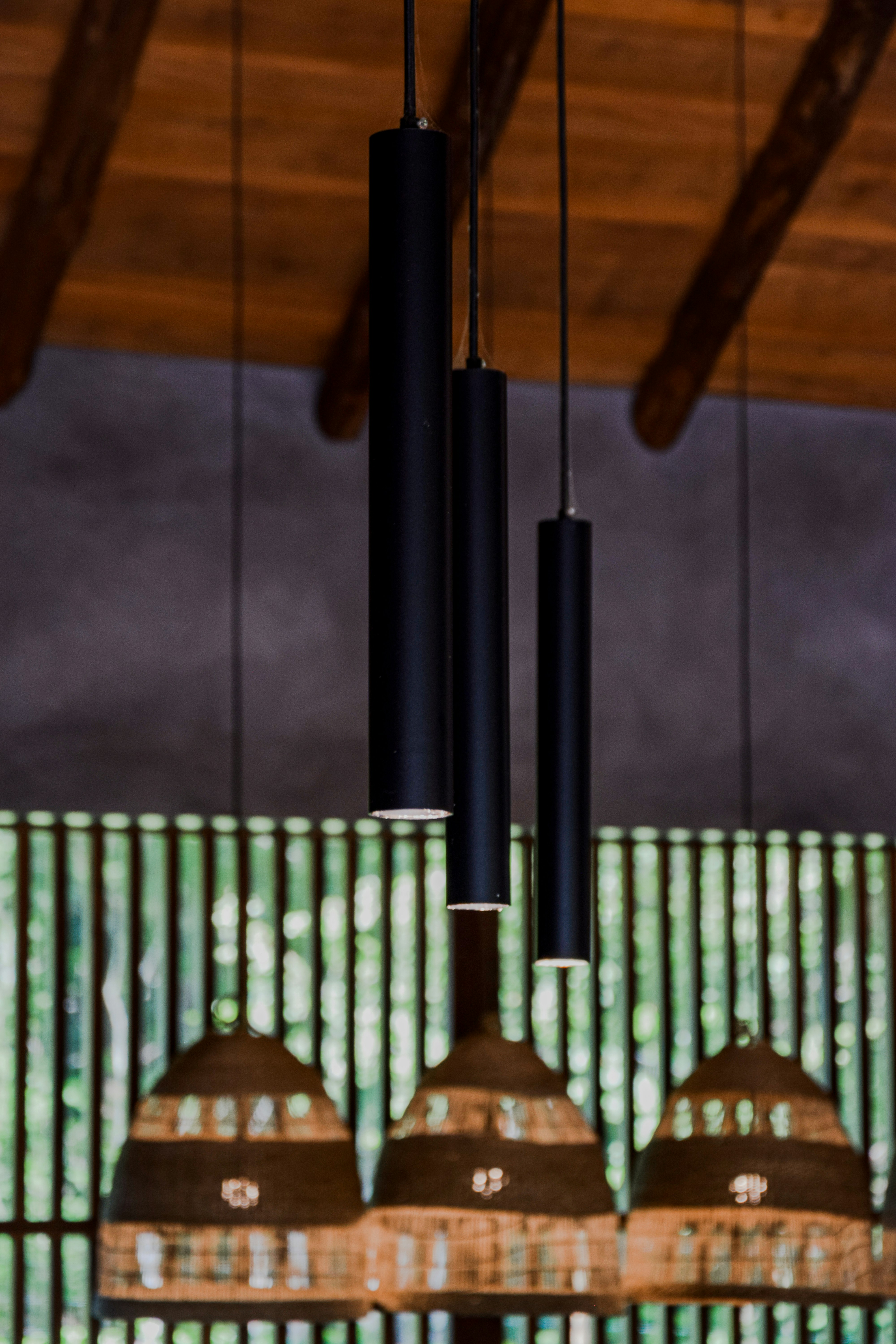 Suspended Cylinders: A Soothing Composition of Lighting and Wood