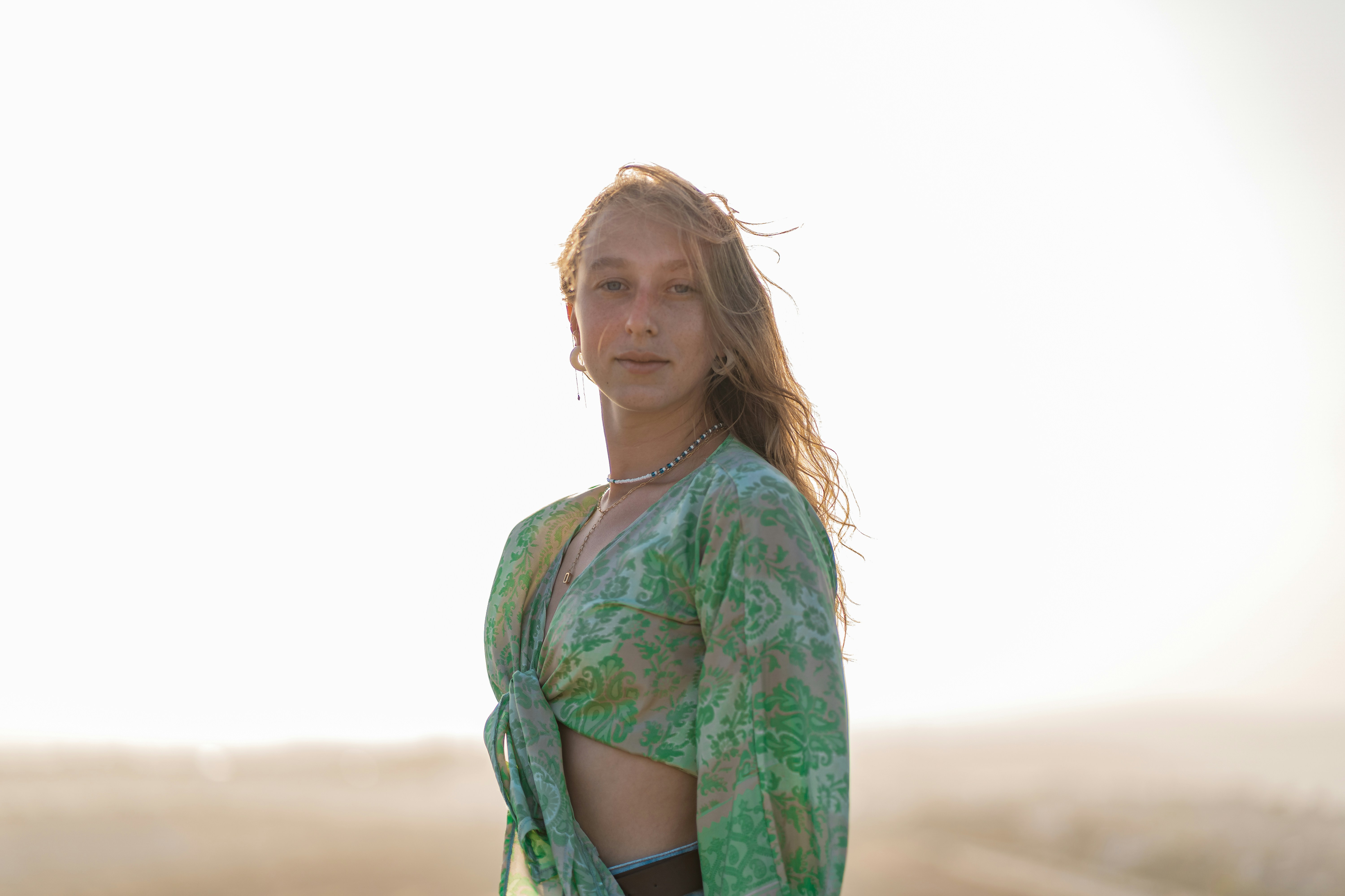 Sunlit Portrait in a Wind-Swept Dune Moment