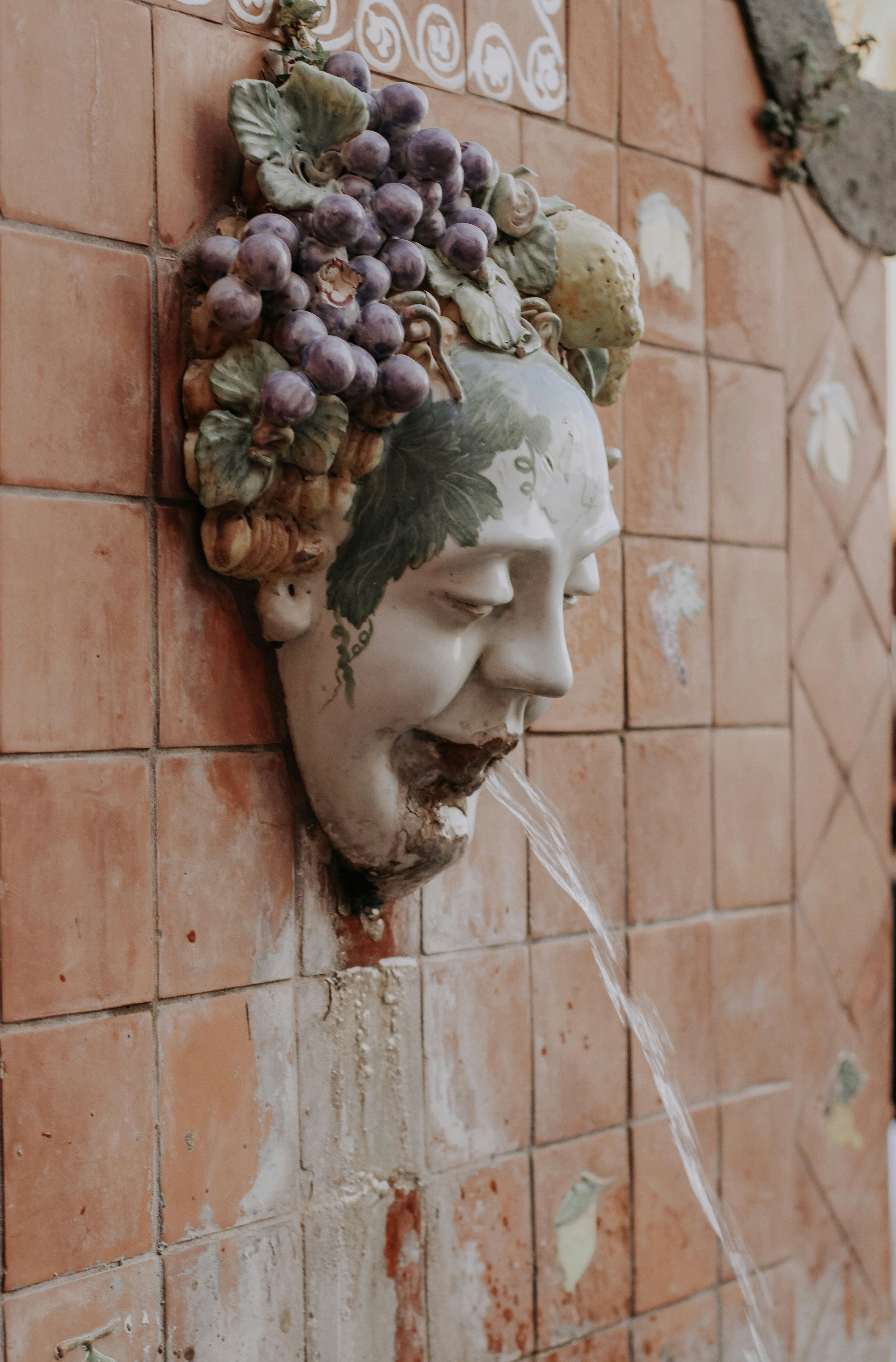 white ceramic head bust with brown and white flowers