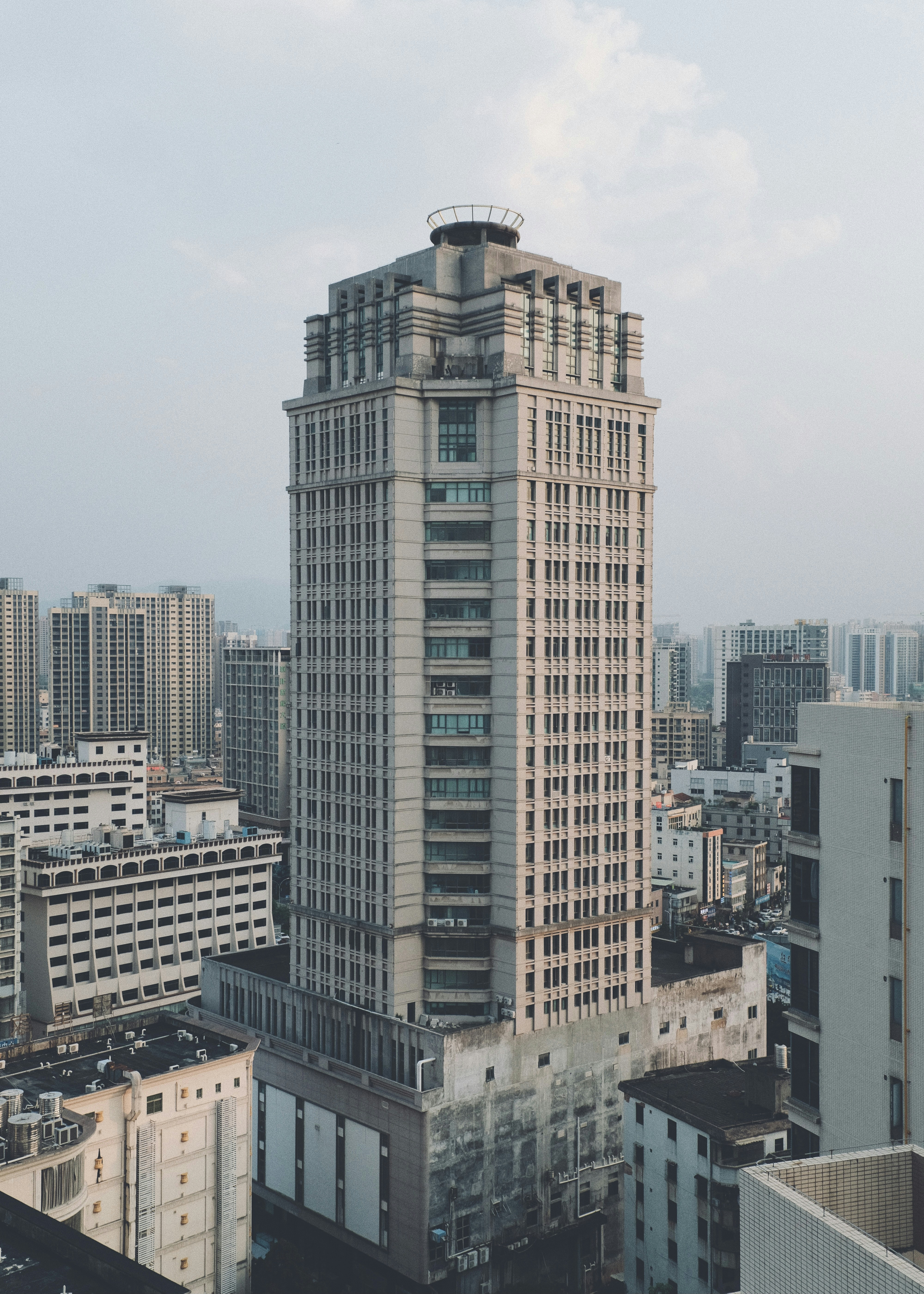 Crown of Concrete: The Central Tower Rising Above a Sea of City Blocks