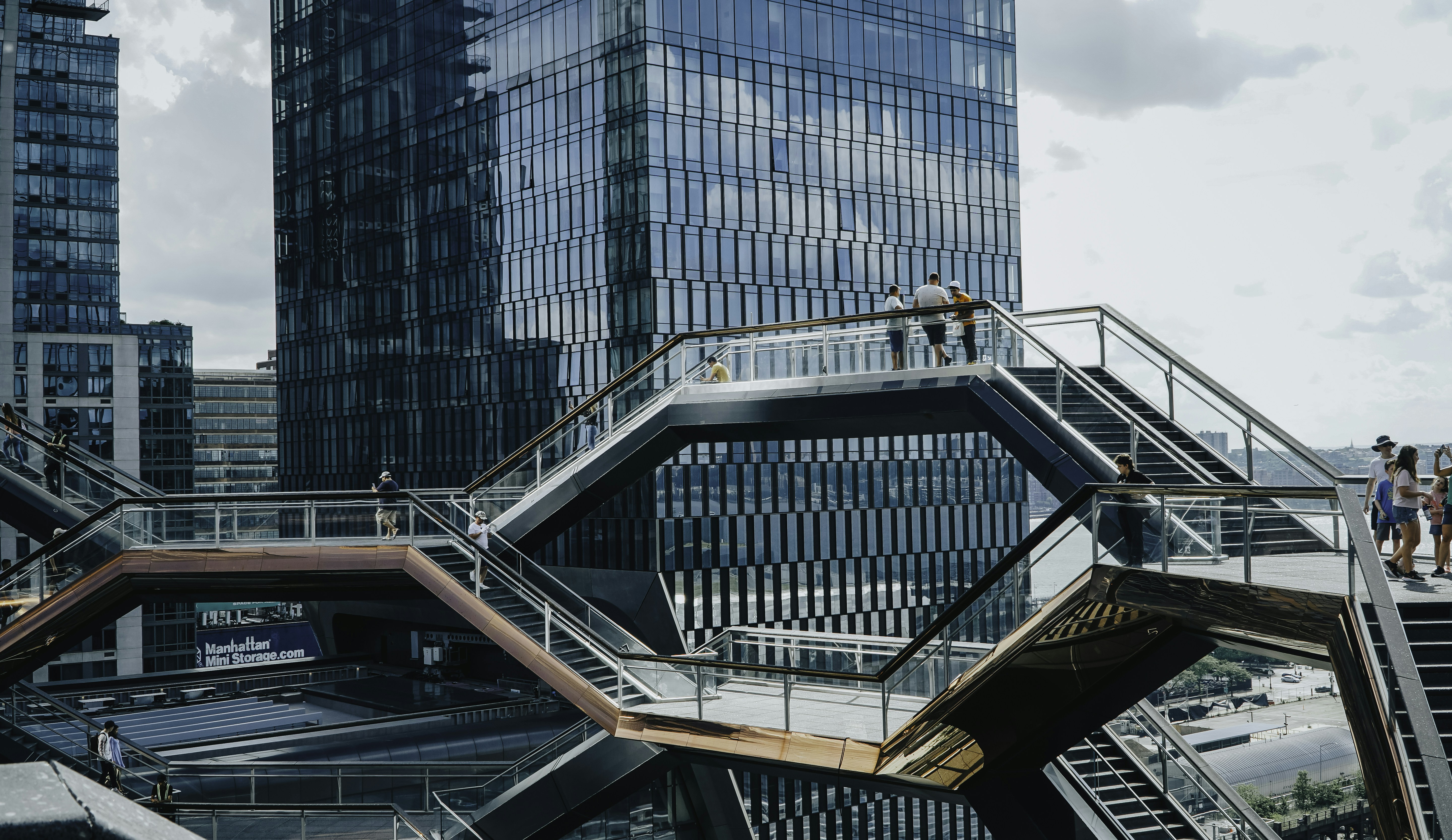 Skyward Lattice: Pedestrian Bridges Framing a City of Glass