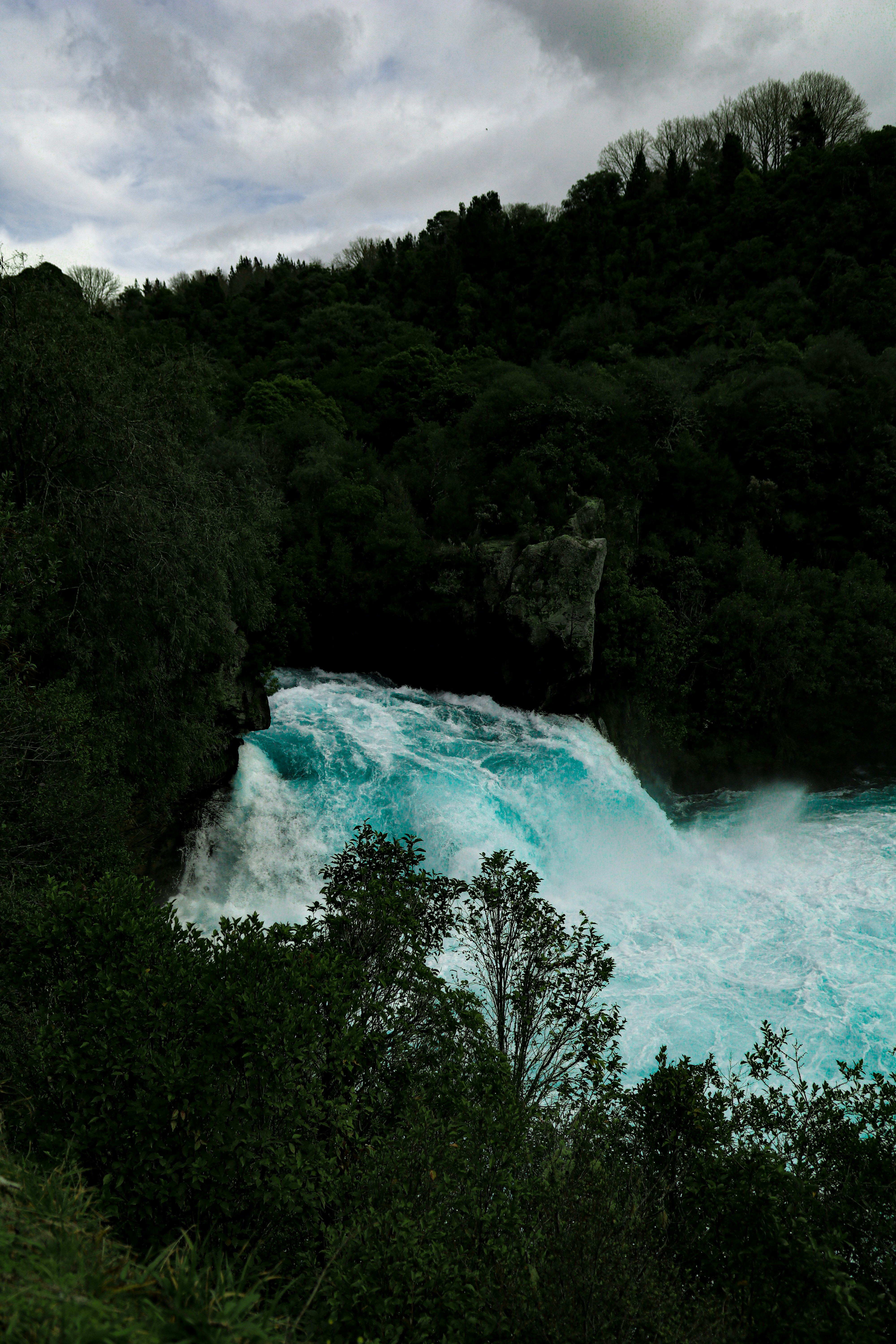 Turquoise Veil: A Narrow Gorge Embraced by Forest