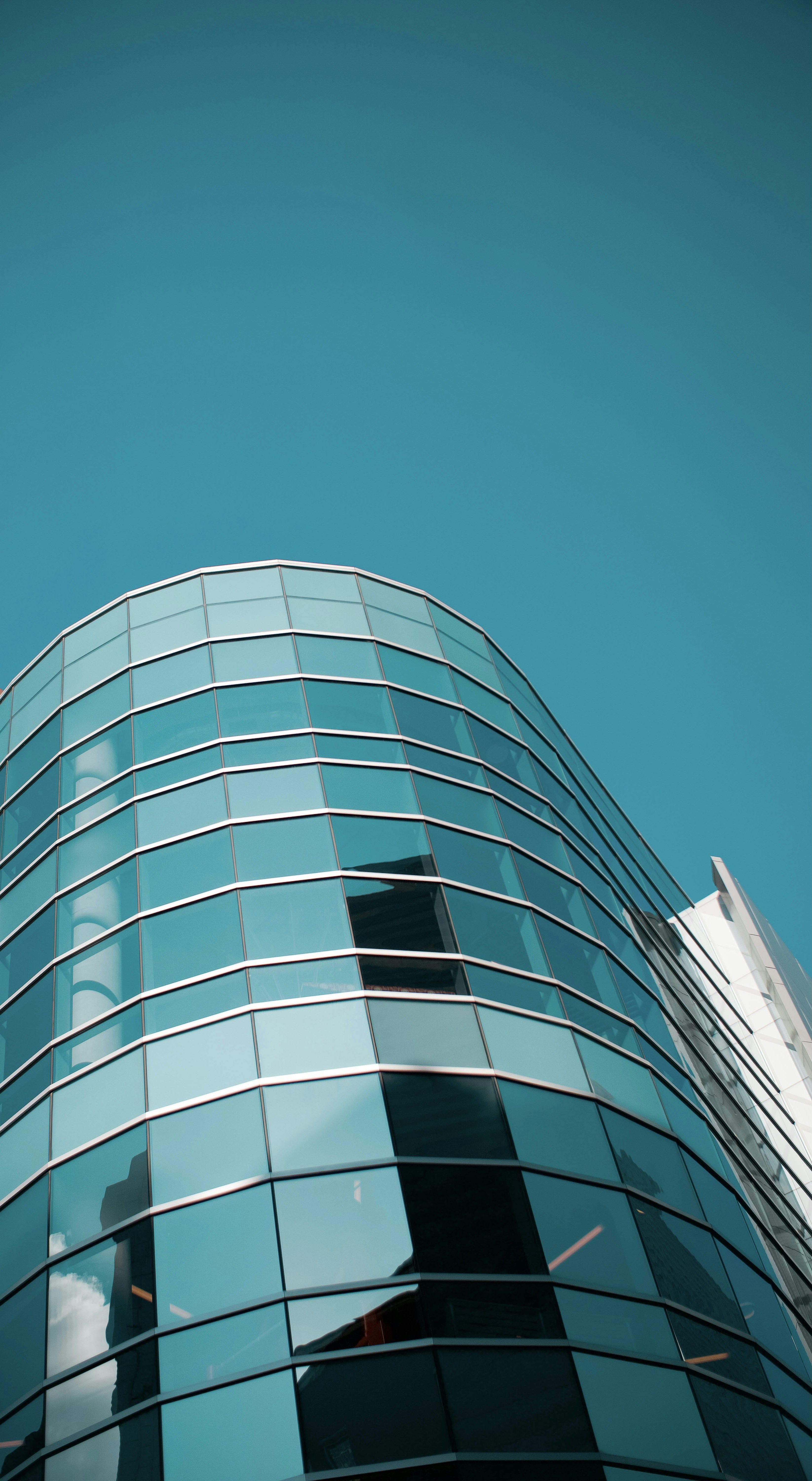 White and blue concrete building photo – Free Office building Image on ...