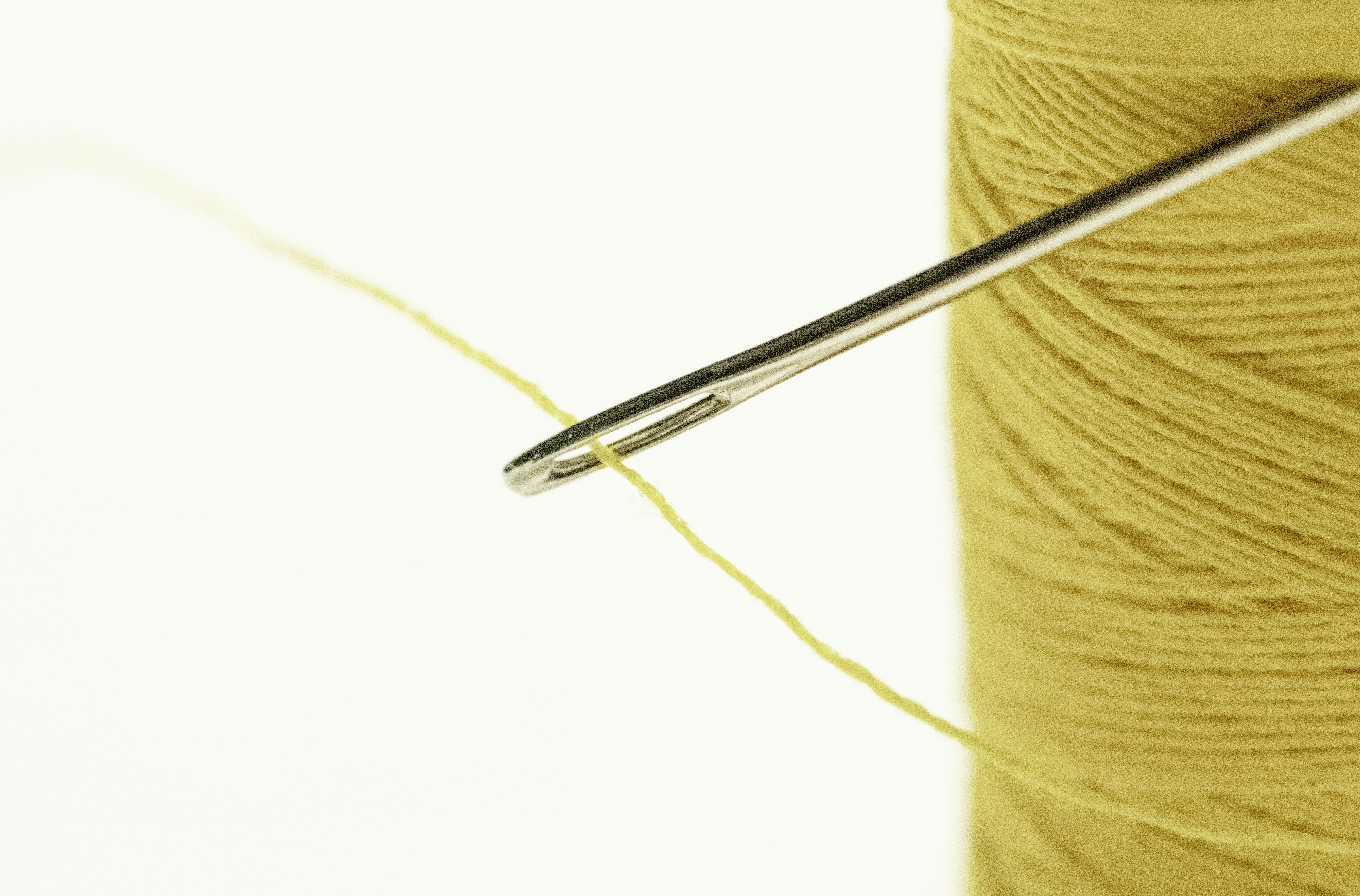 Brown thread with gray needle photo – Free Canada Image on Unsplash