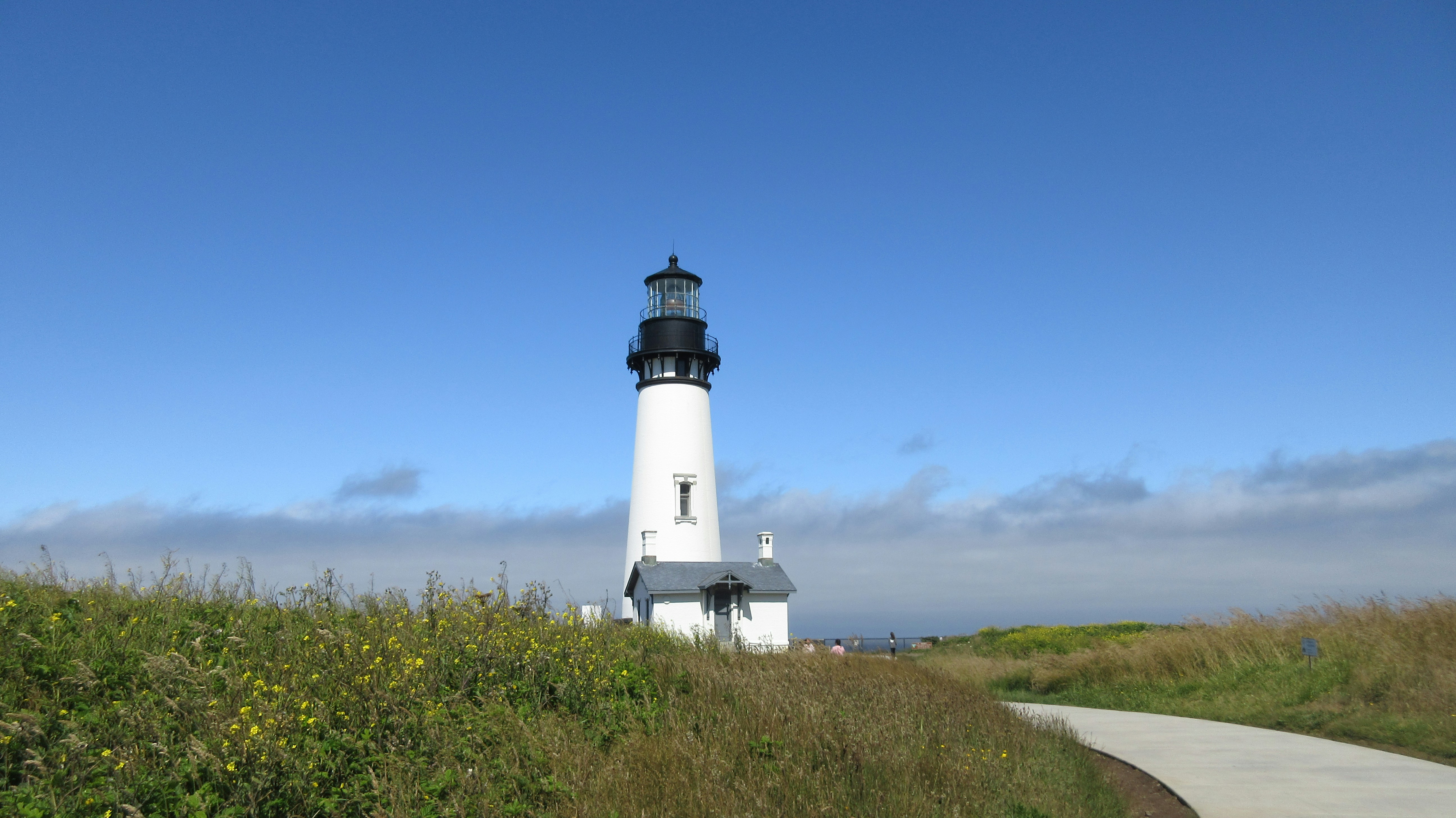 White and black lighthouse under blue sky during daytime photo – Free ...