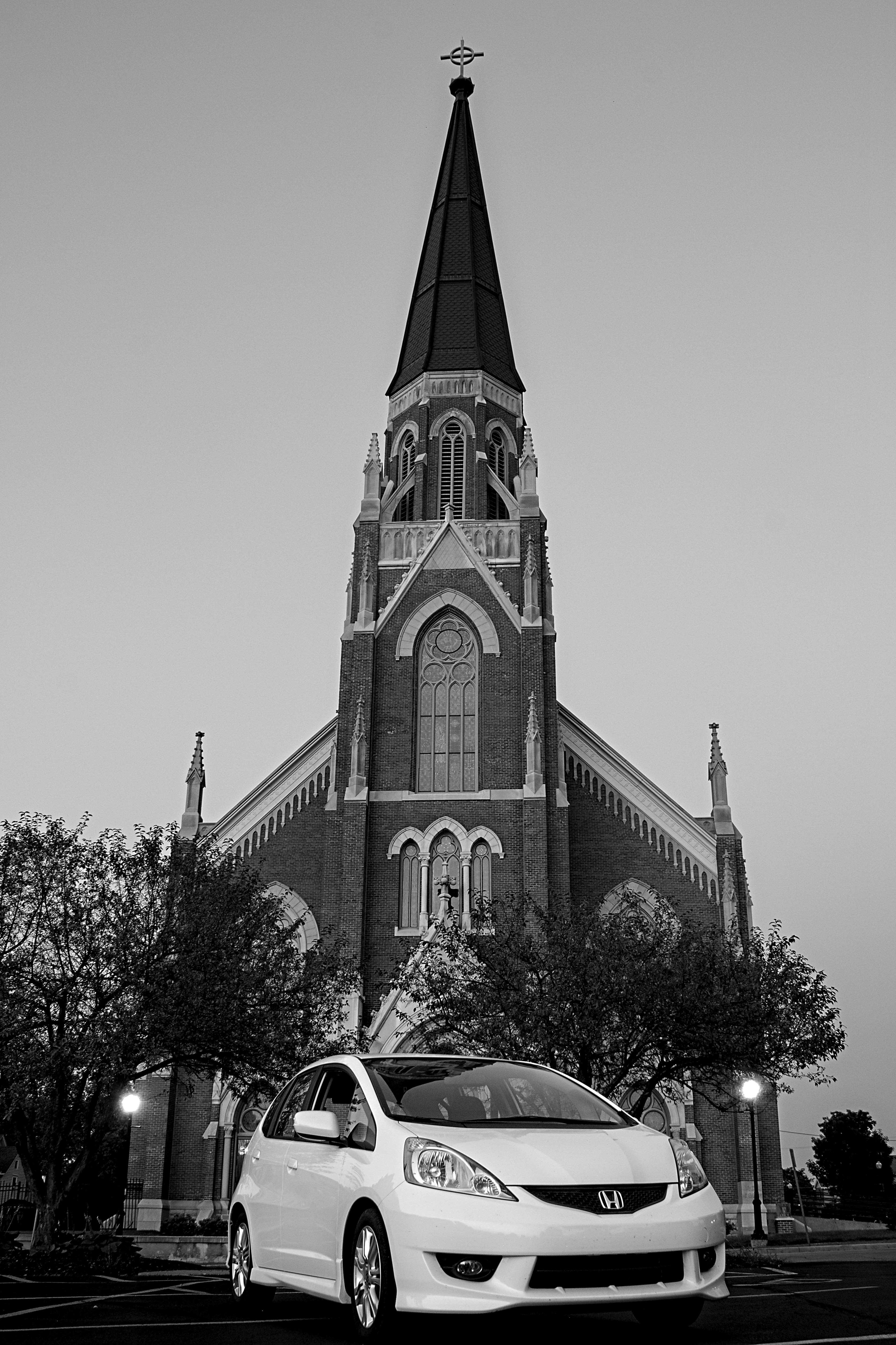 black and white cathedral under gray sky