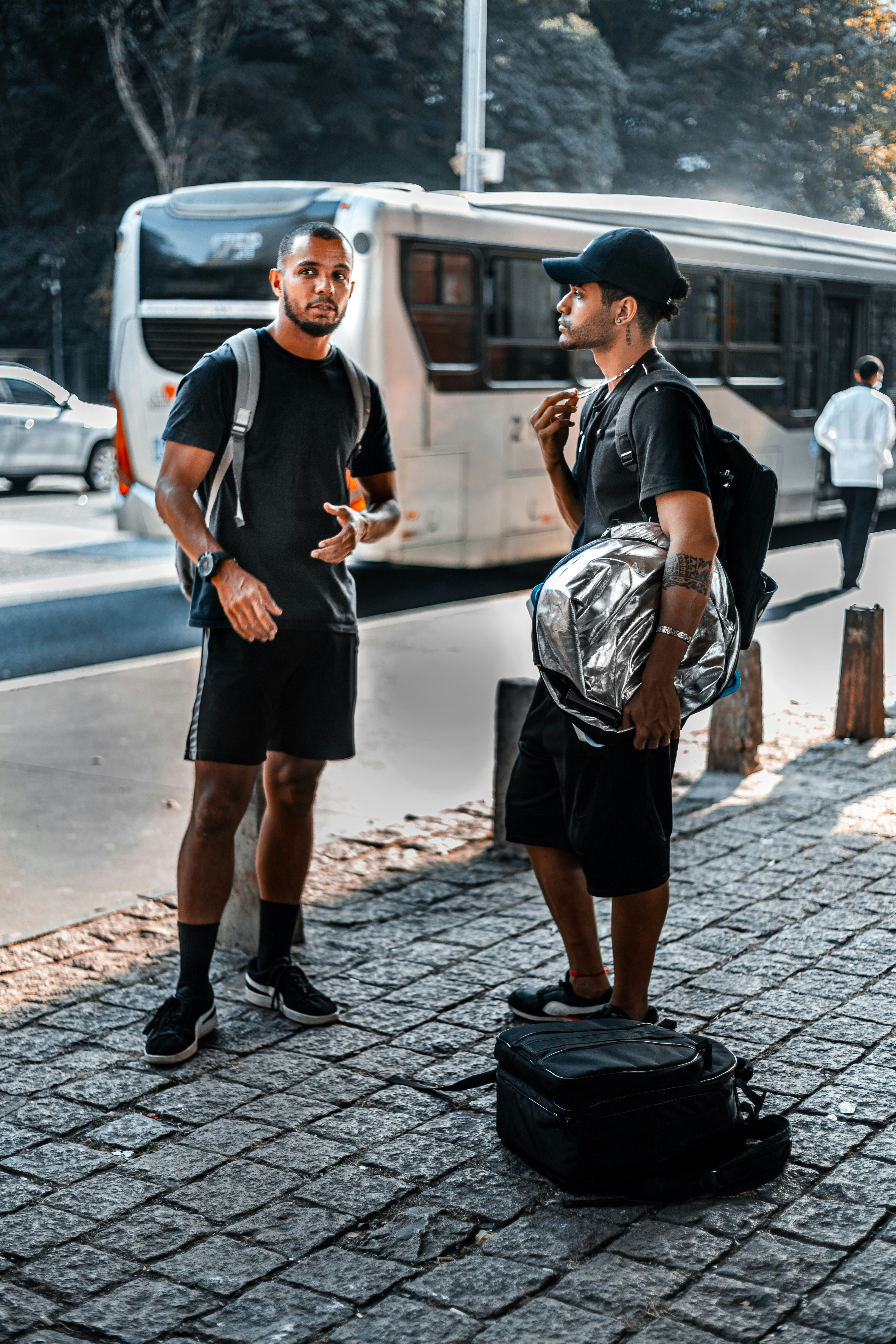 Urban Encounter on a Cobblestone Street