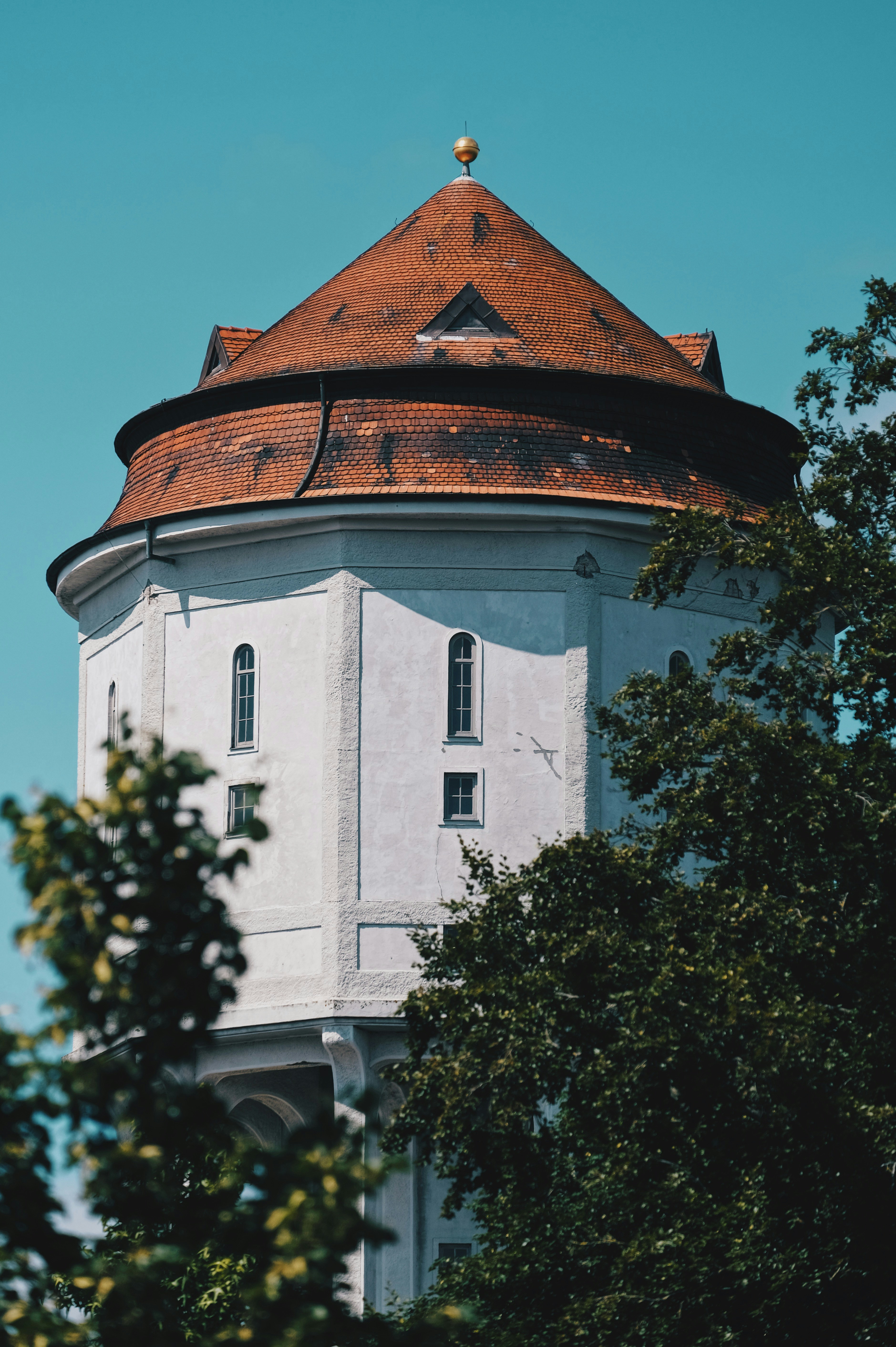 A tower in Emden, Germany | white and brown concrete building