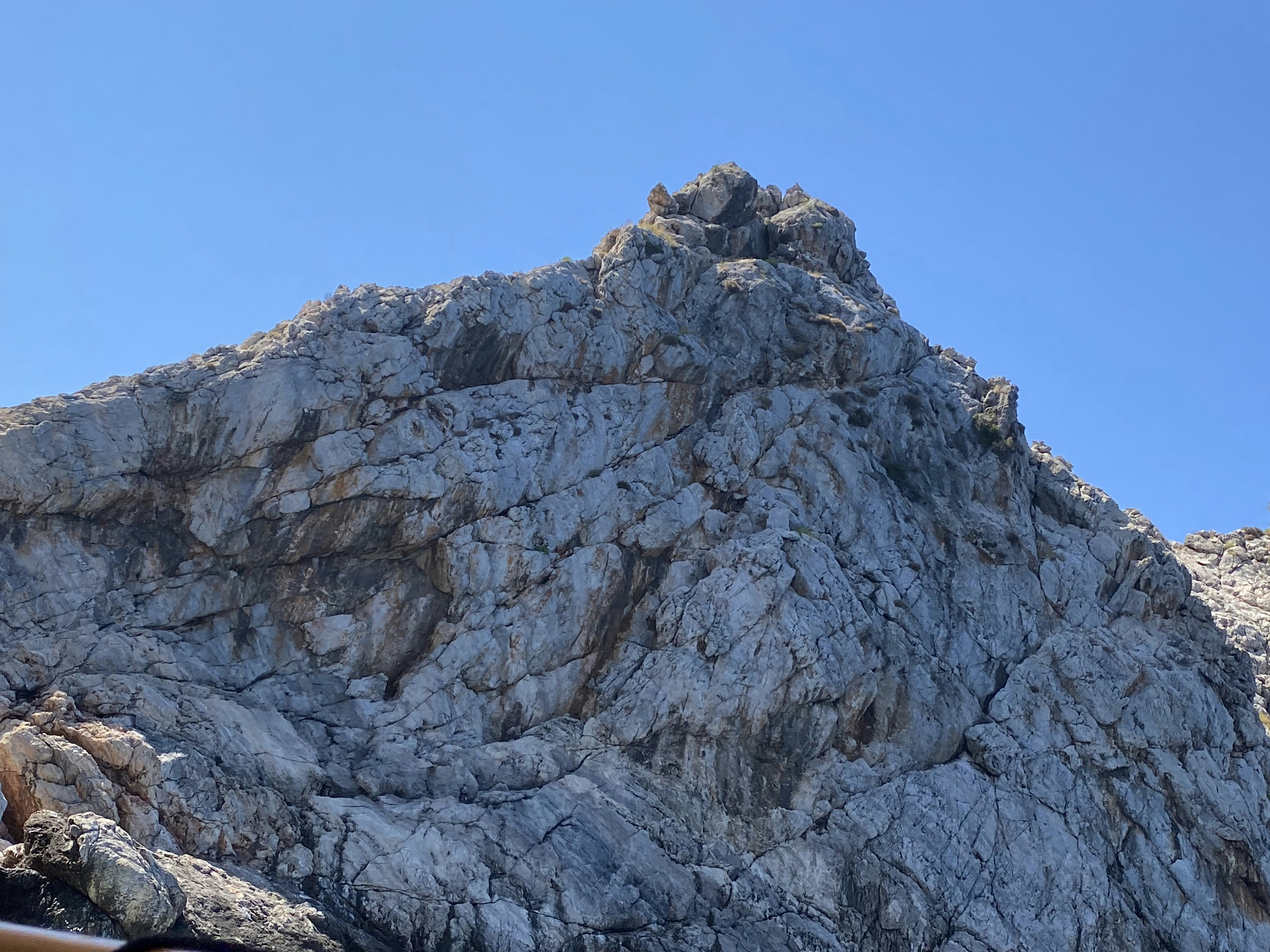 Gray rocky mountain under blue sky during daytime photo – Free Mountain ...