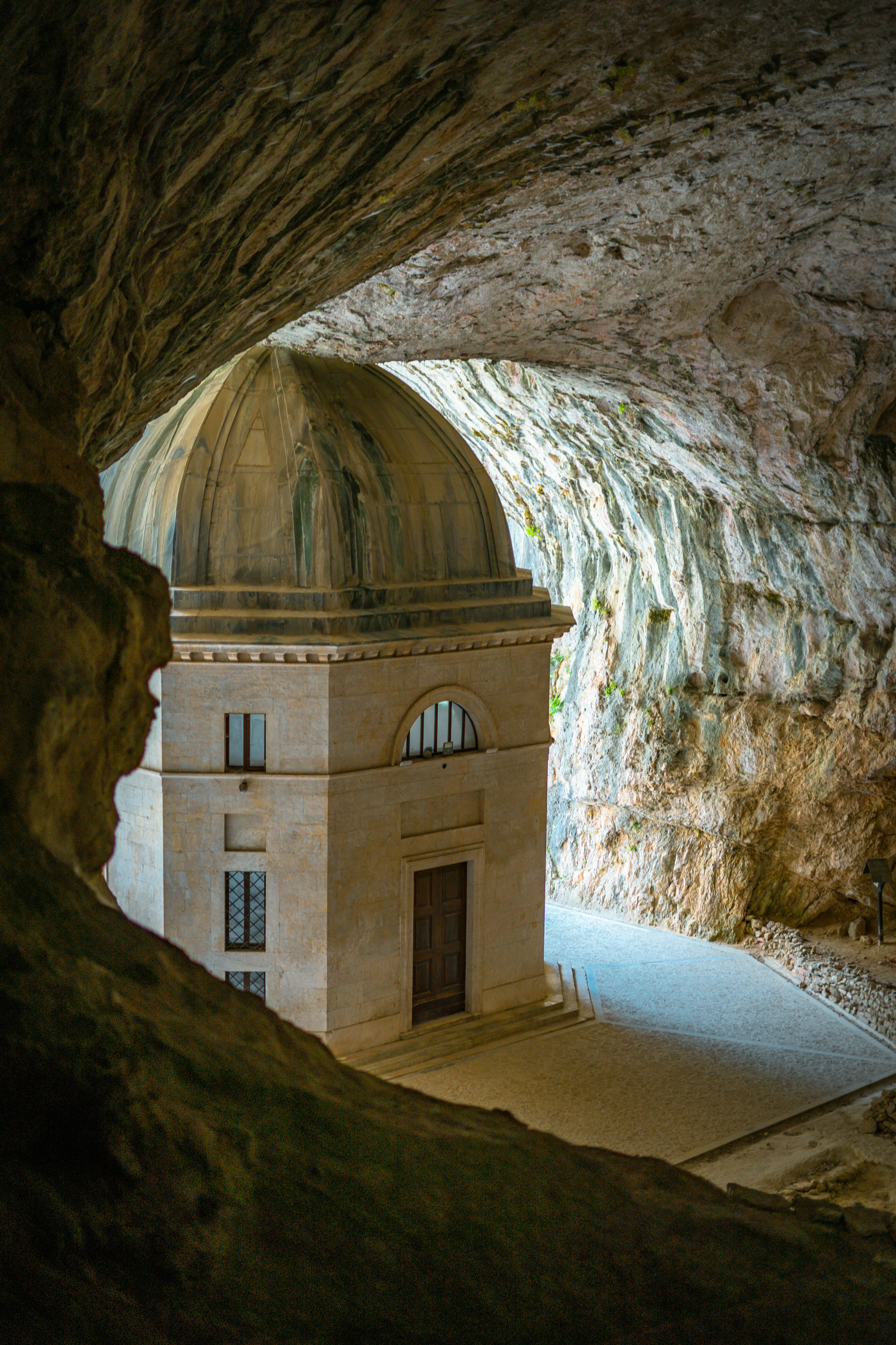 Cavern Dome Sanctuary: Light Framing a Rock-Worn Chapel