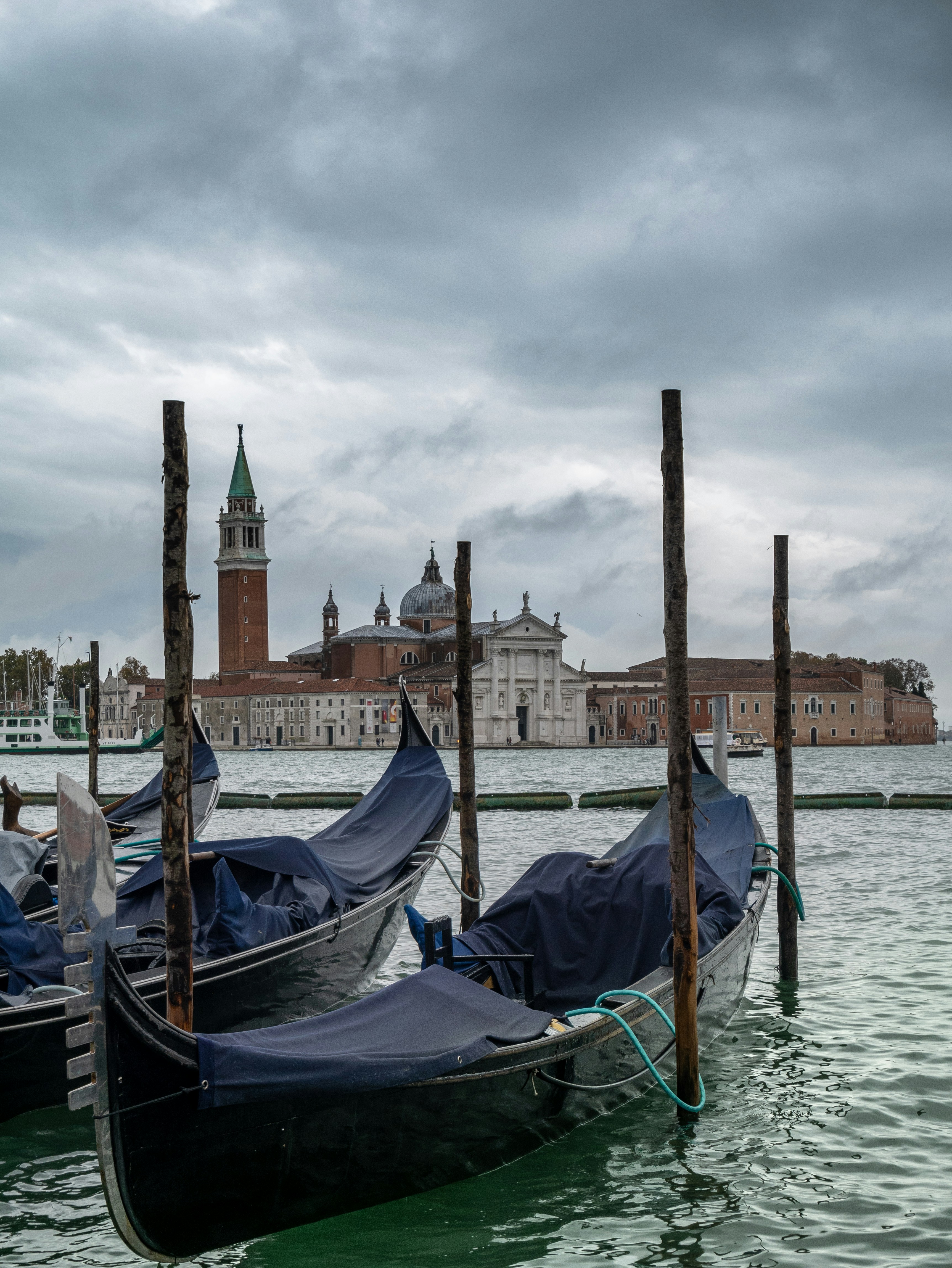 Gondolas at Dusk: Silent Boats and Venetian Backdrop