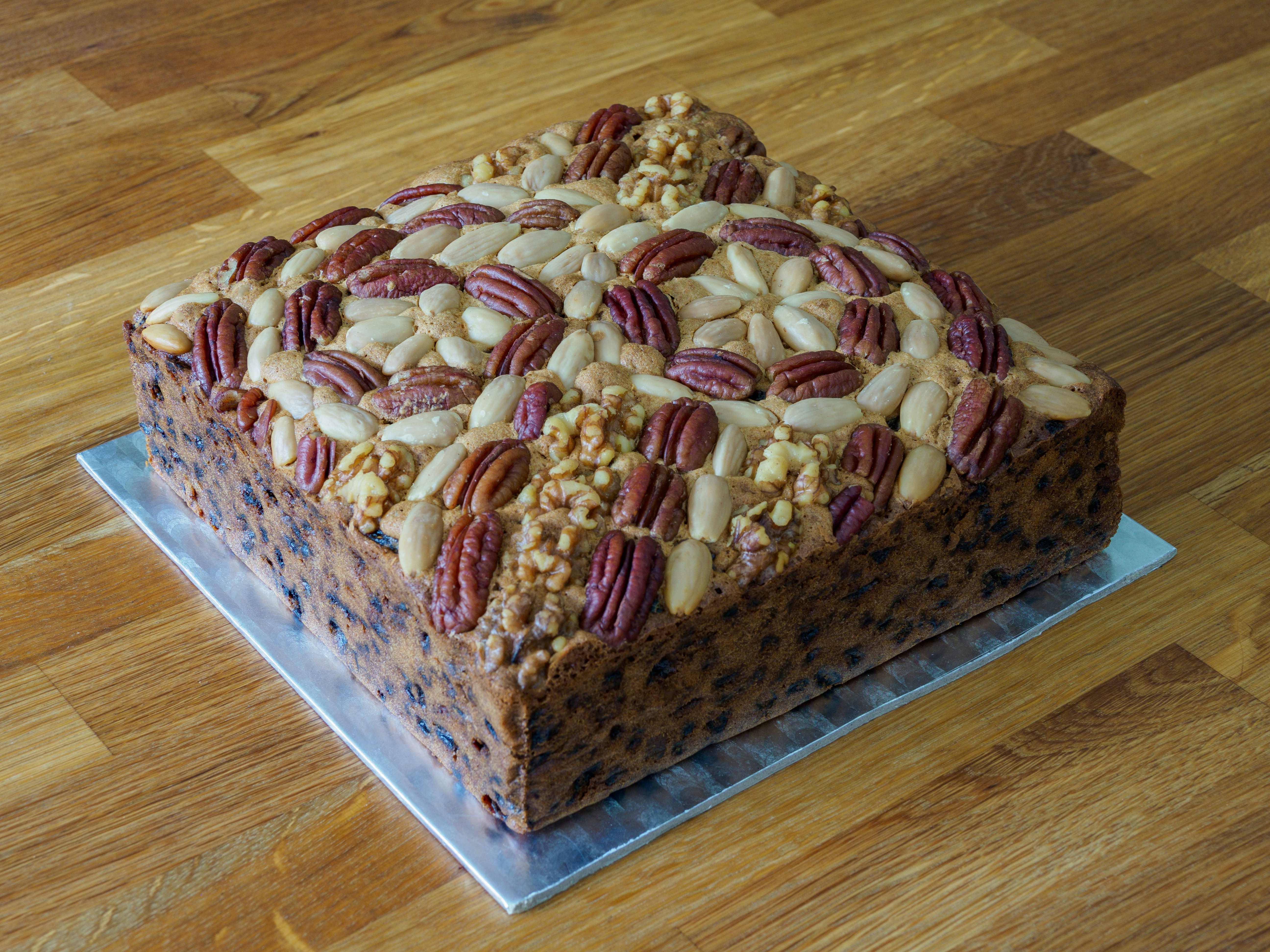 Brown and pink pastry on brown wooden table photo – Free Food Image on ...