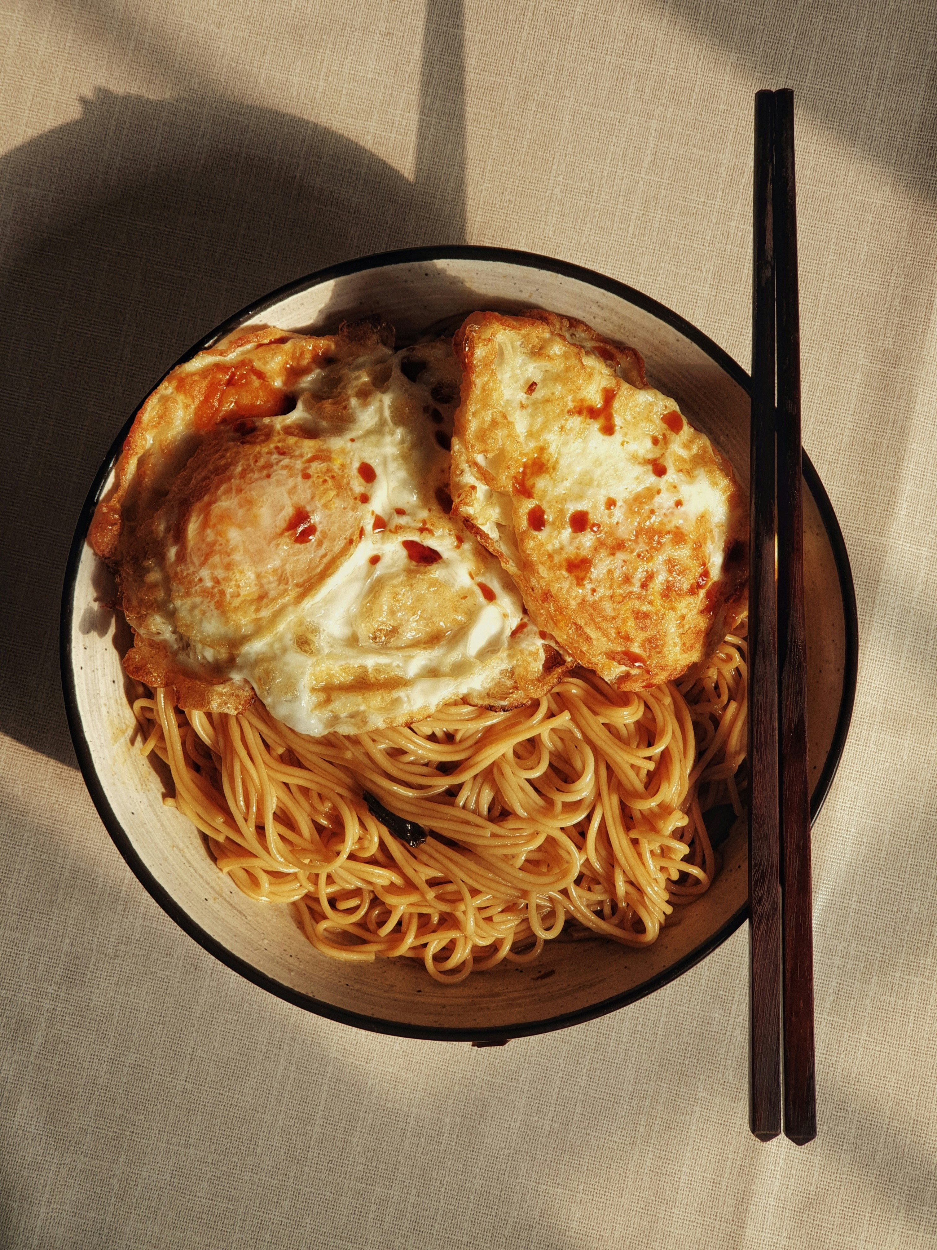 pasta dish on brown ceramic bowl