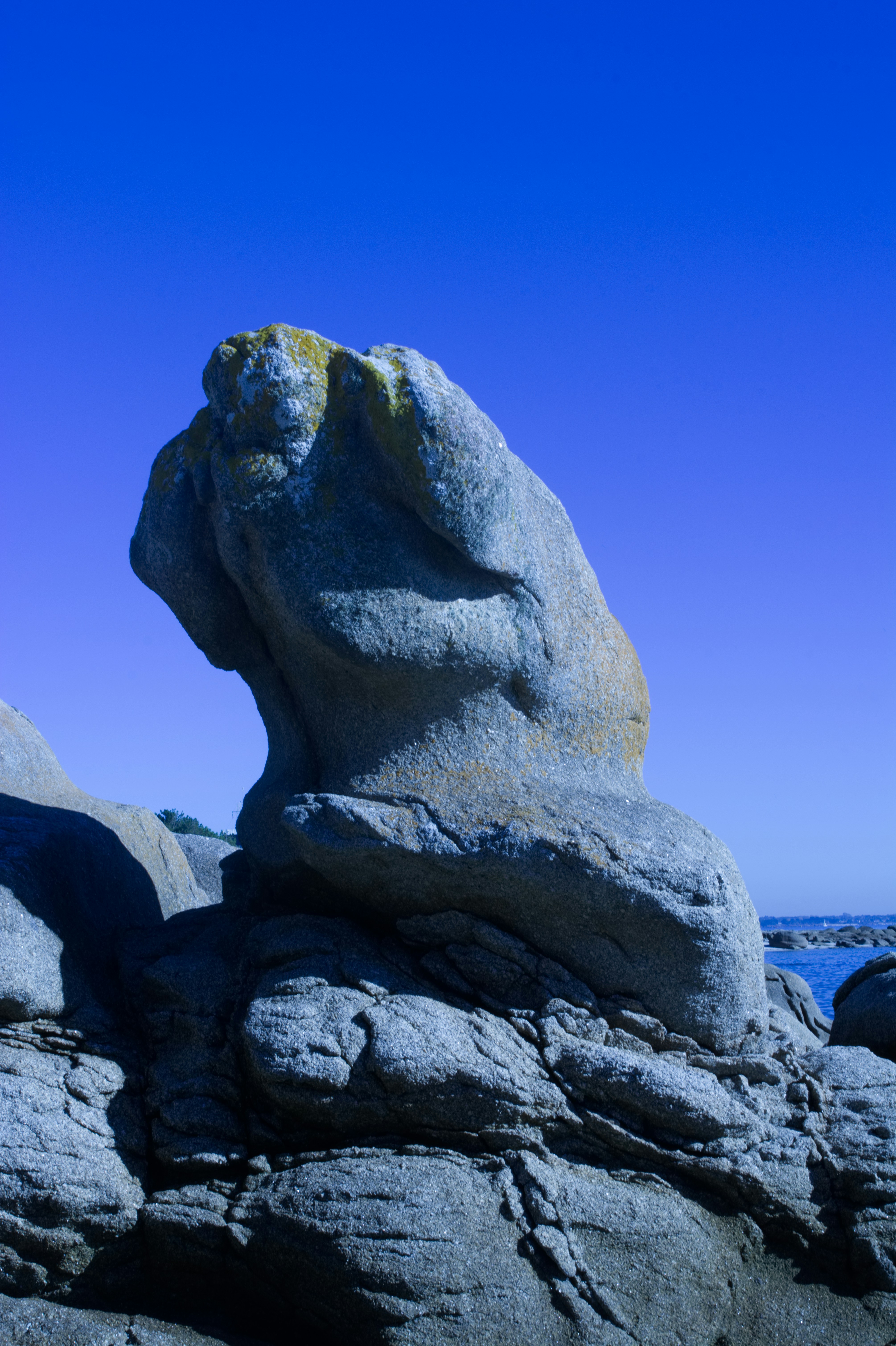 Gray rock formation near body of water during daytime photo – Free Rock ...