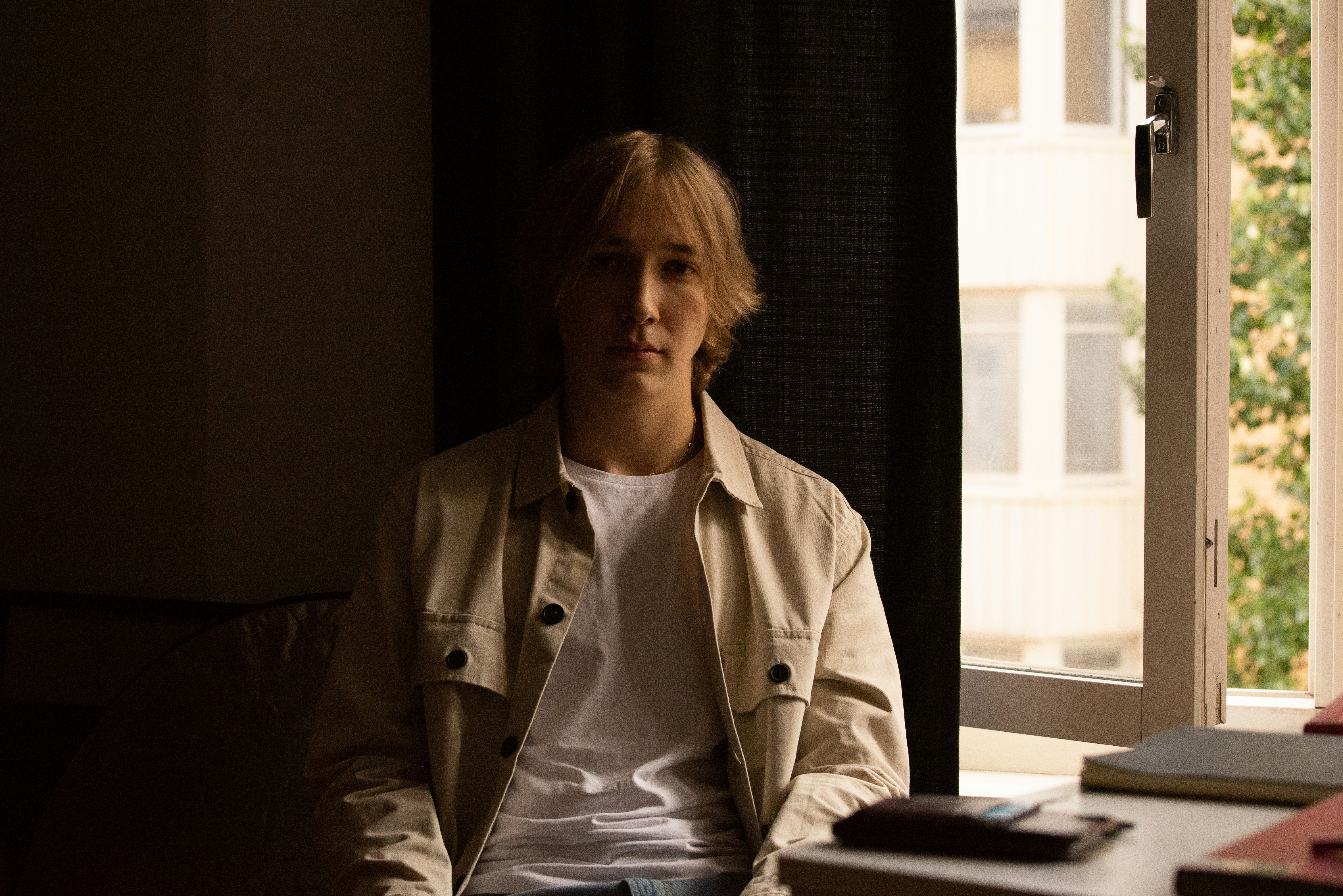 Windowsill Quiet: A Portrait in Soft Indoor Light