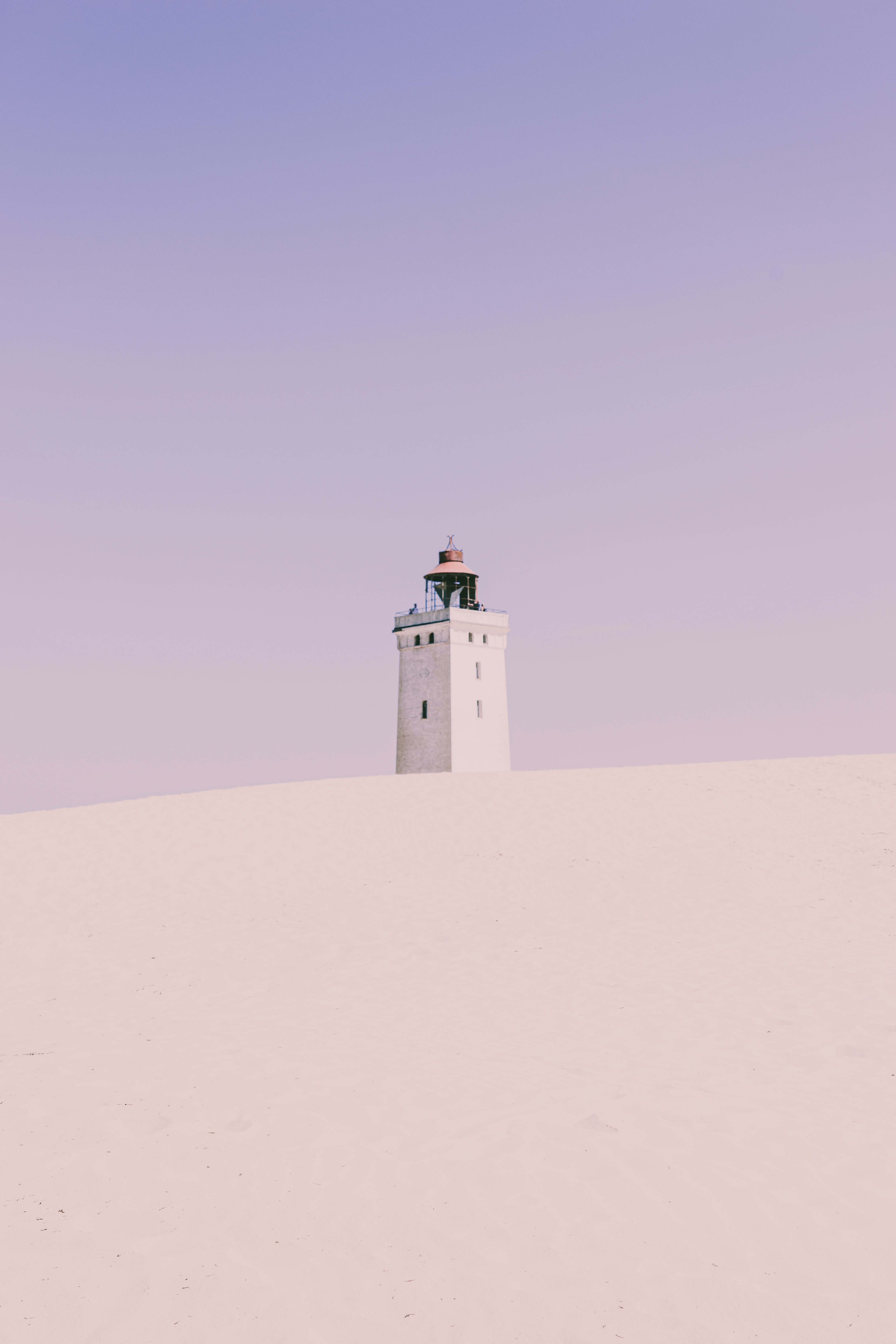 White concrete lighthouse on white sand during daytime photo – Free ...