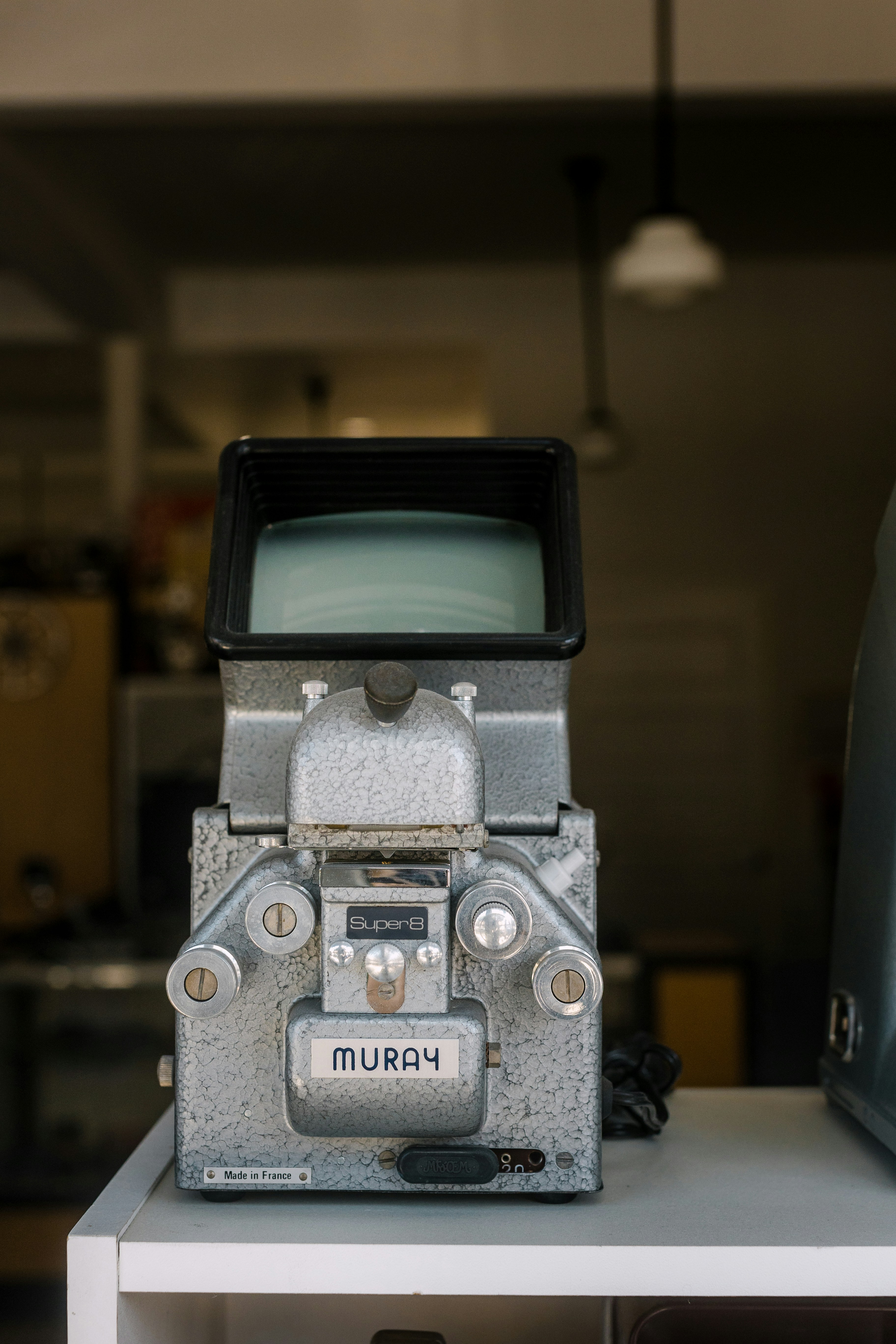 Muted Machinery: Muray on a Quiet Workshop Shelf