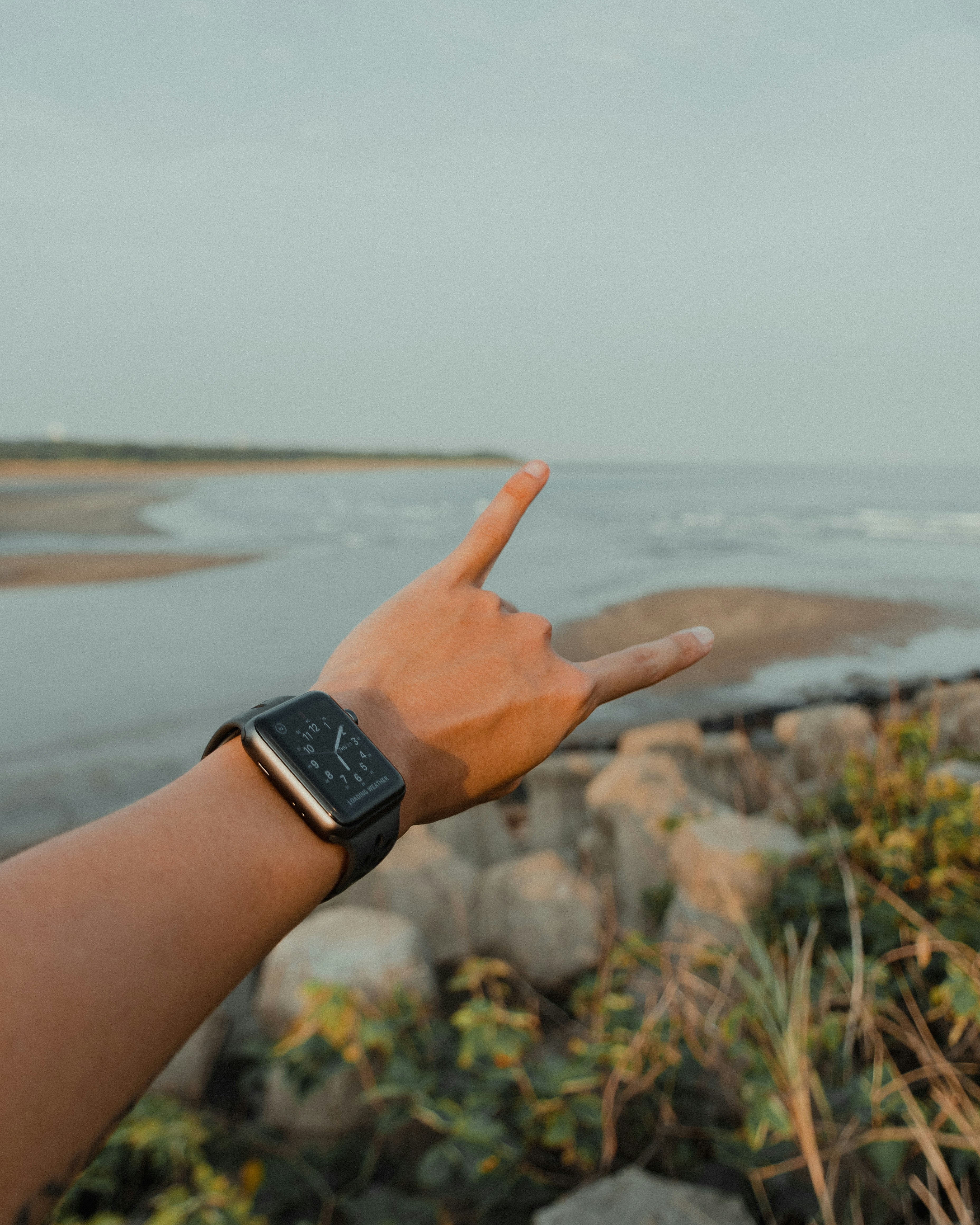 Signal in Steel: A Wristwatch Arches a Toward the Sea