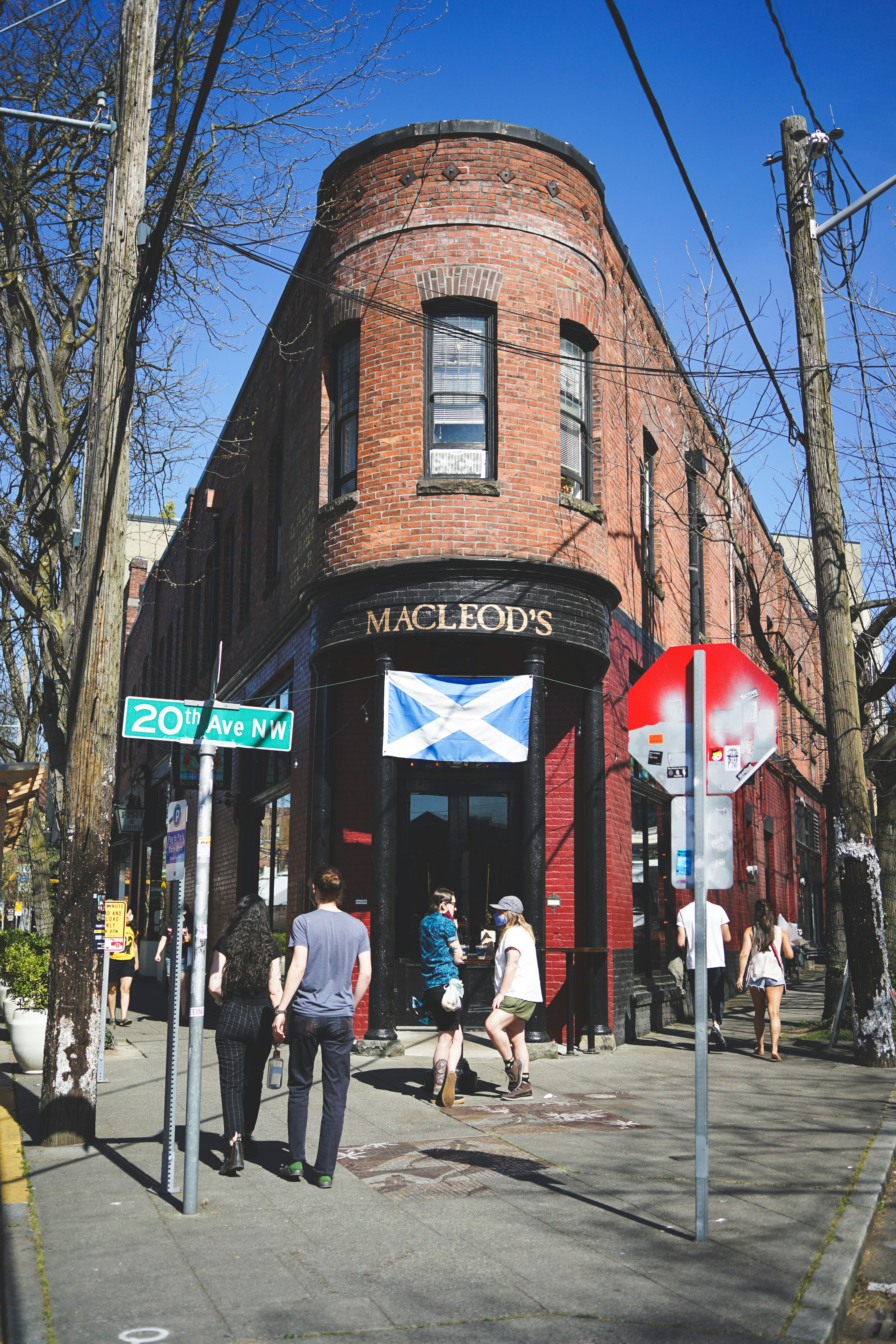 MacLeod's Corner: A Brick Facade Breathing Street Life