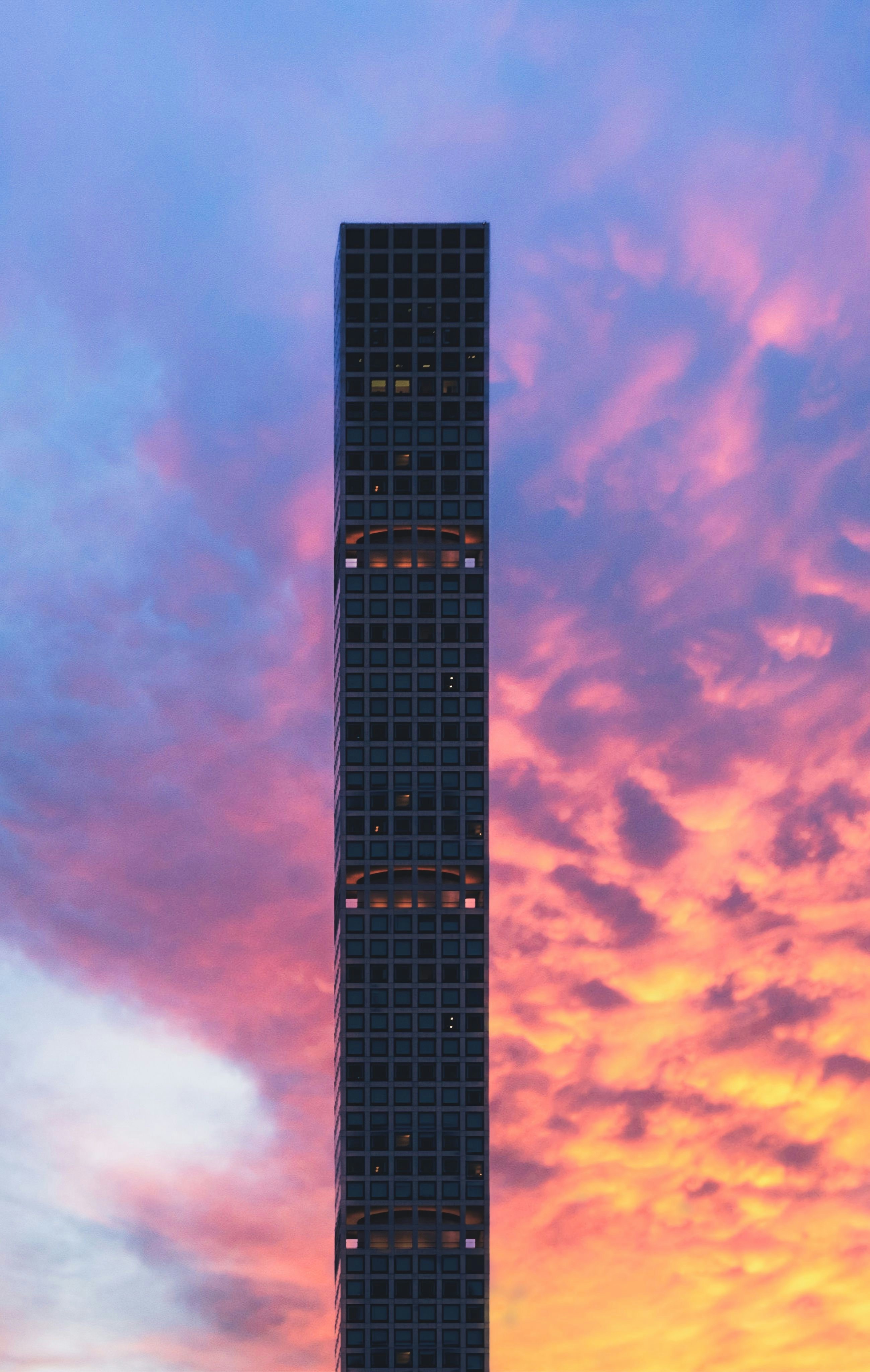Grid Tower at Twilight: A Monolith Against a Fiery Sky