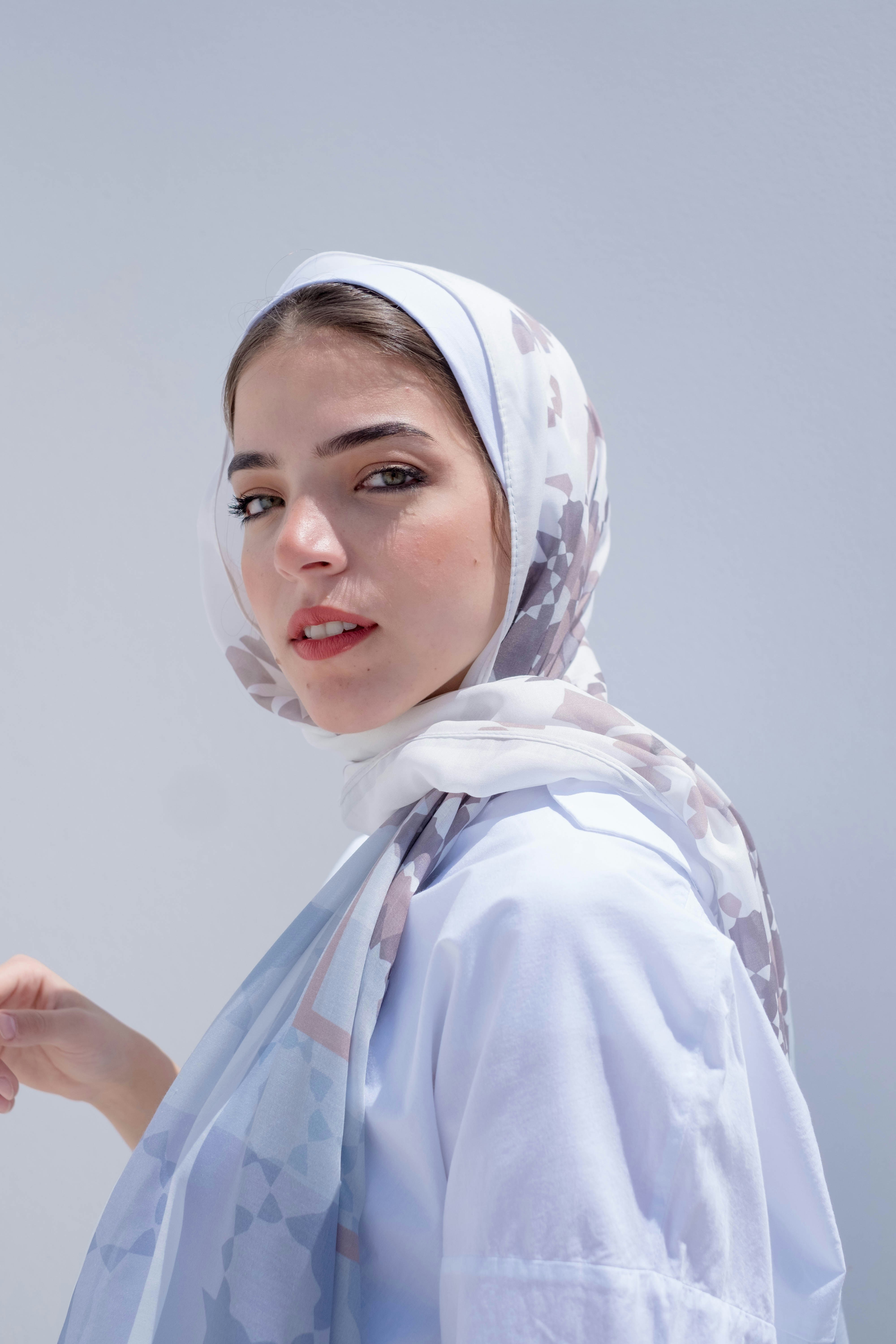 Soft-Lit Portrait: Quiet Gaze in a Patterned Hijab