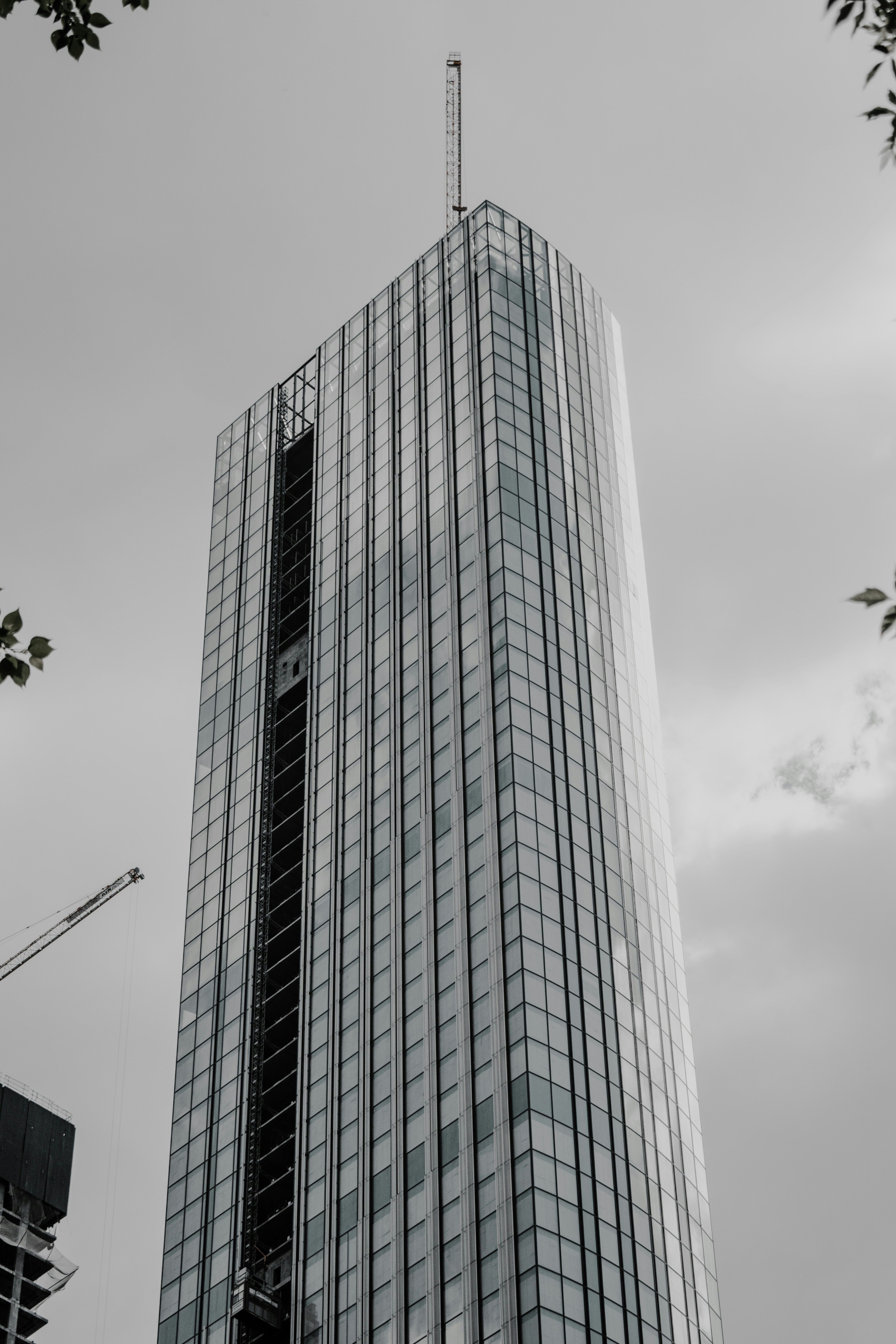 White and blue concrete building under gray sky photo – Free Grey Image ...