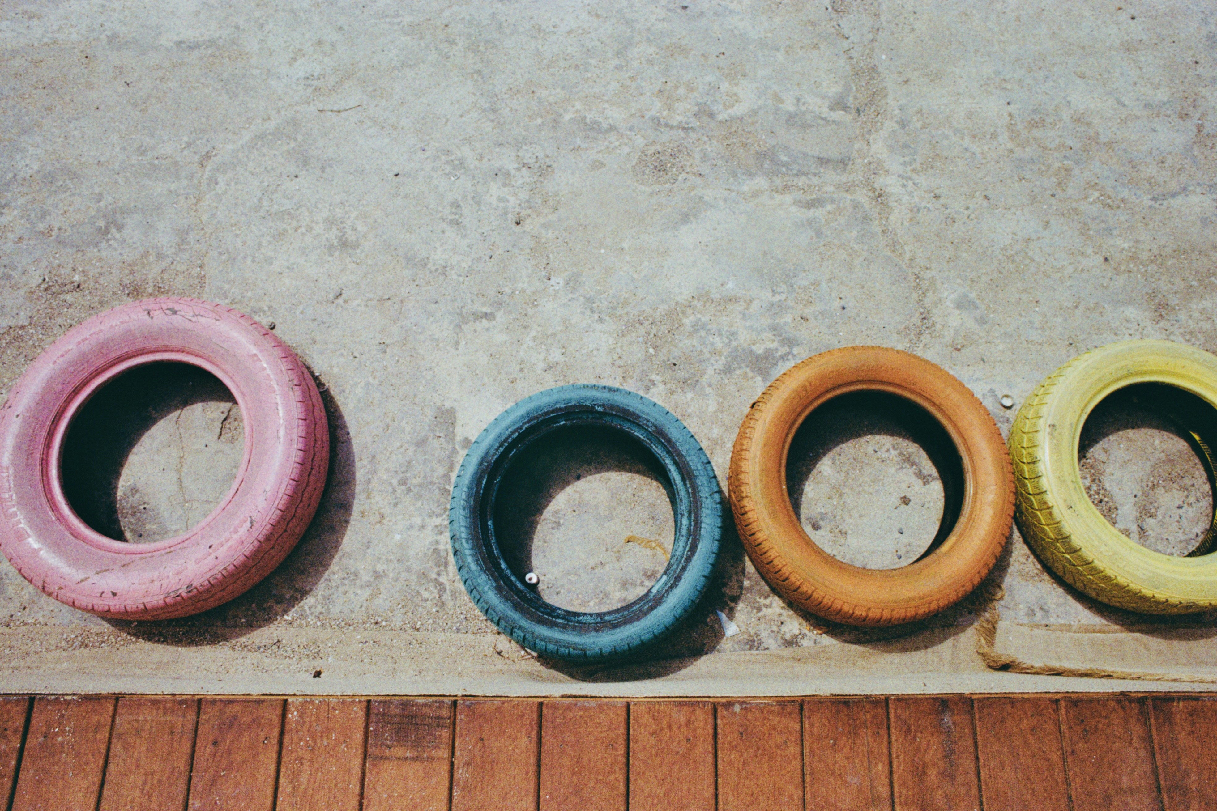 Four different colored tires lined up in a row photo – Free İstanbul ...