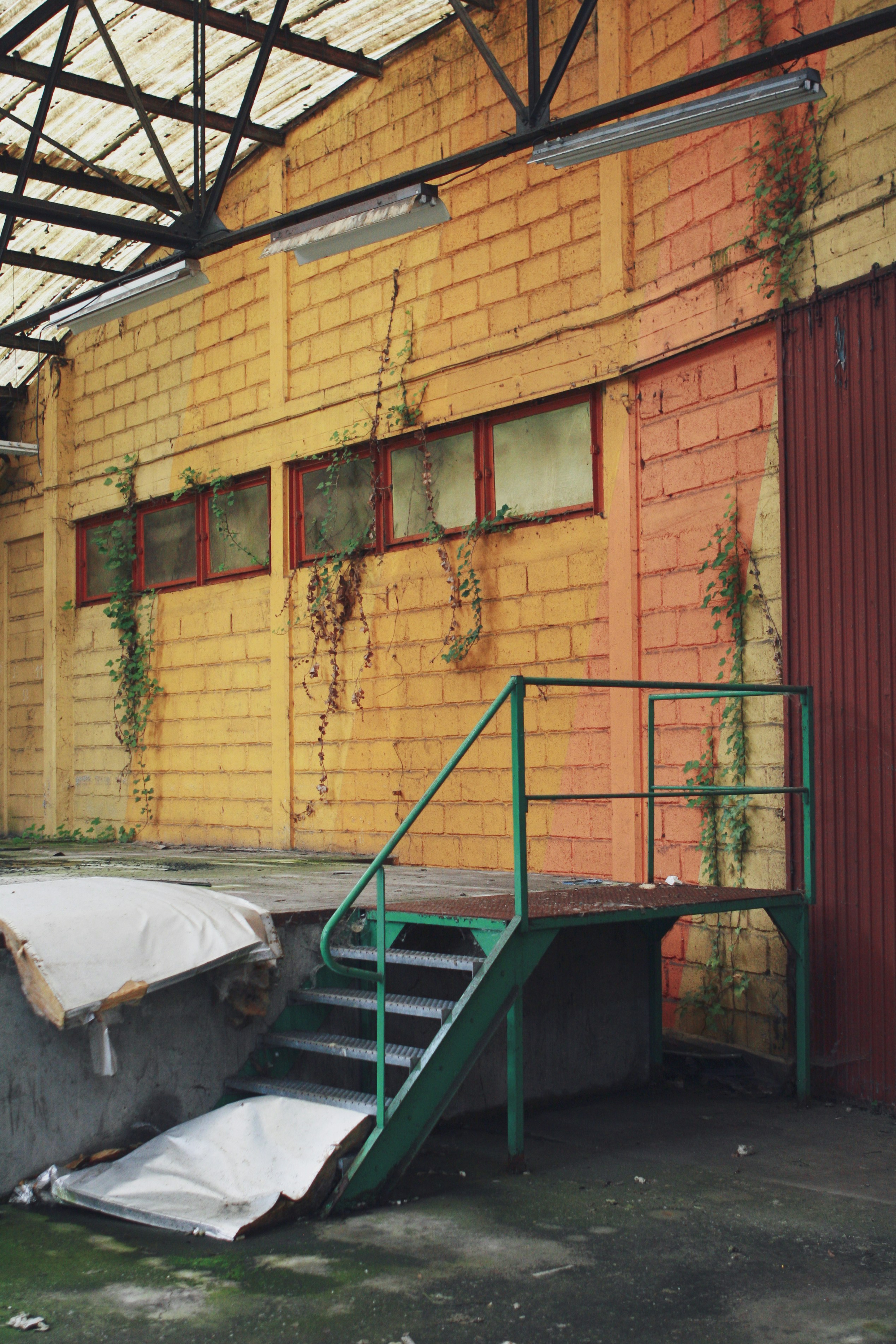 Green metal railings near brown brick wall photo – Free #lostplace ...