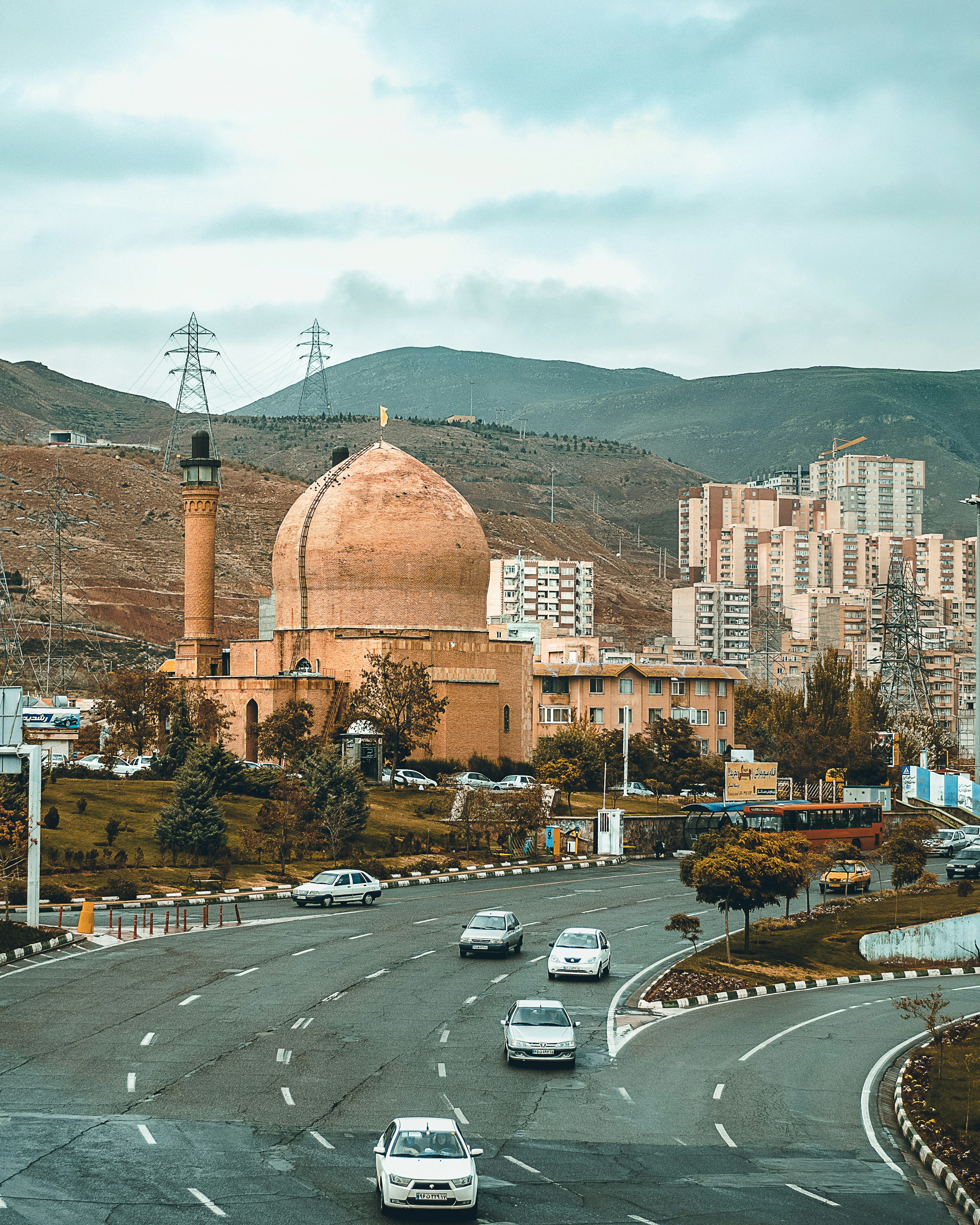 Dome of Memory: Mosque, Boulevard, and Housing Amid Rolling Hills