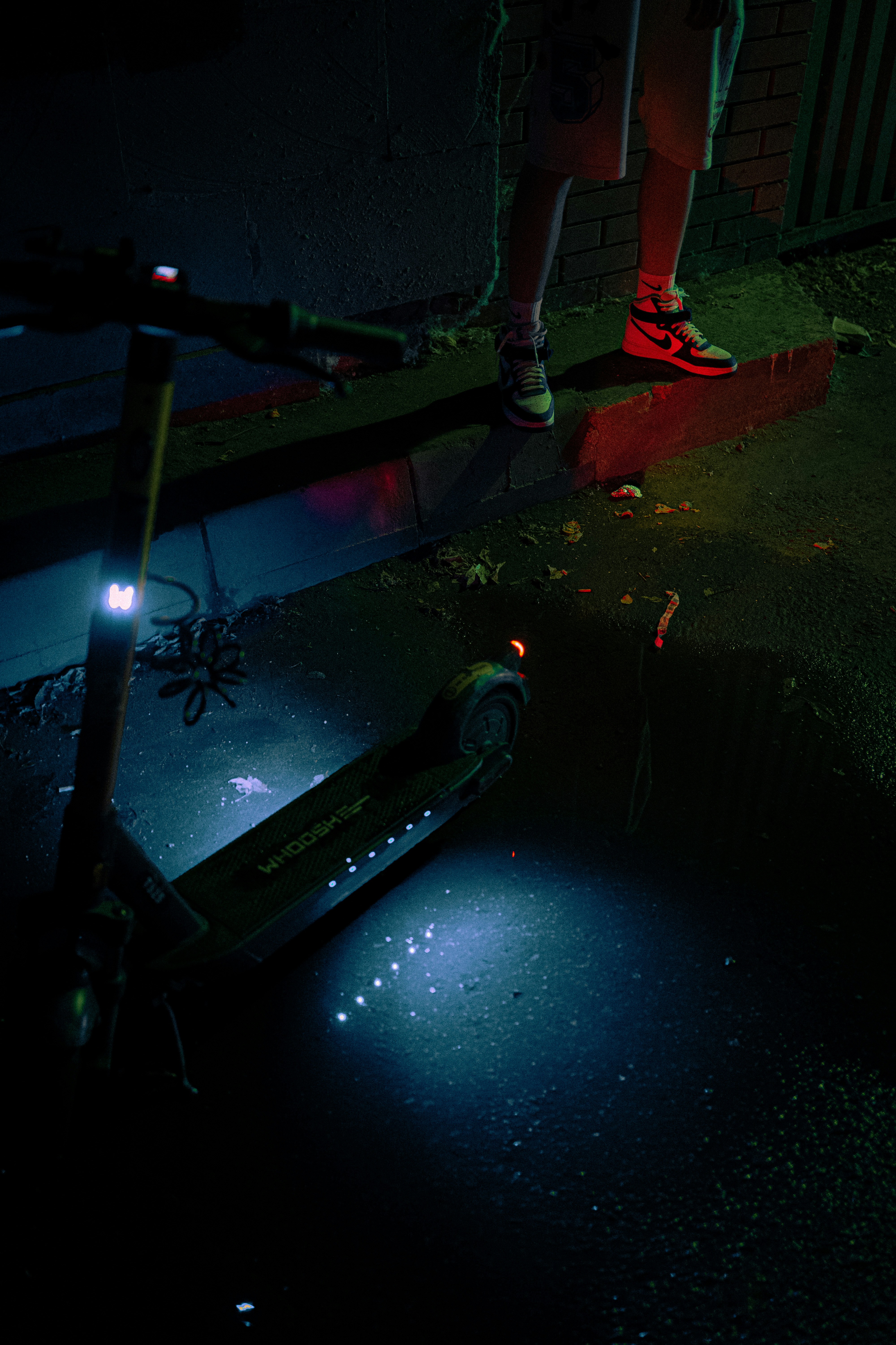 Footsteps at the Edge: Neon-lit Night on a Quiet Bike Ramp